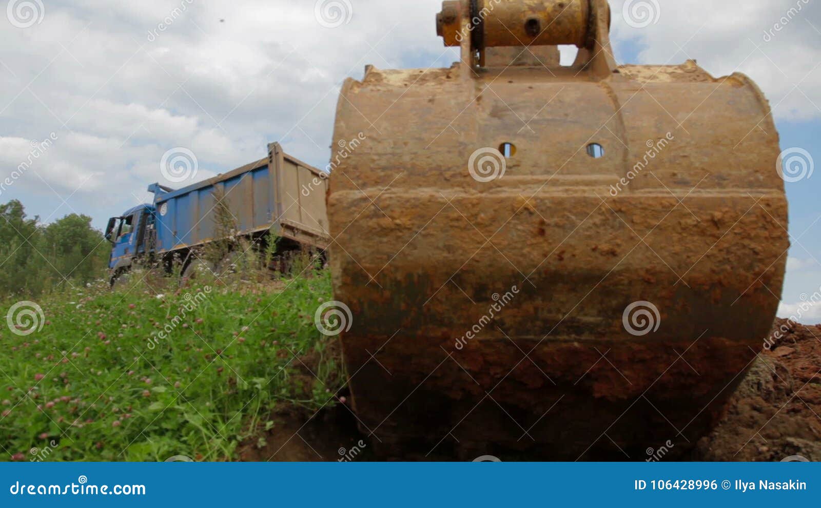 Construction Excavator Scooping and Dumping on Dirt Pile Stock Footage ...