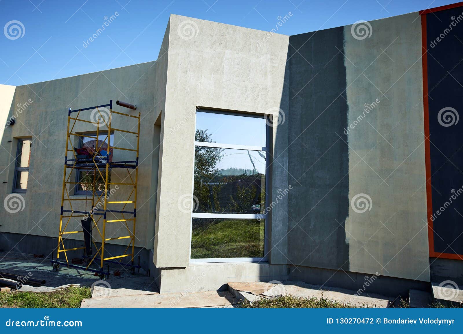 Finishing Building on the Facade of the Building with the Use of Stock ...