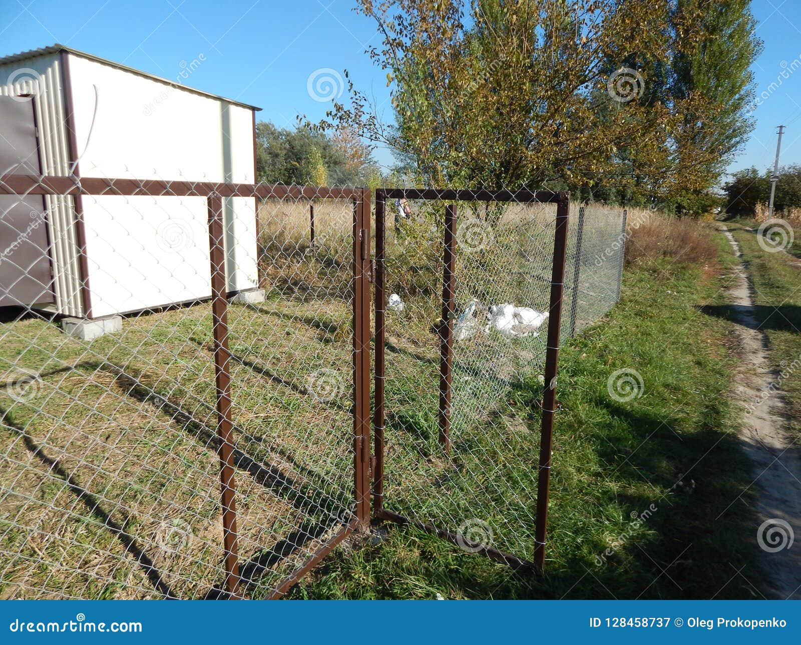 Construction of a Fence from a Chain-link Grid Stock Image - Image of ...