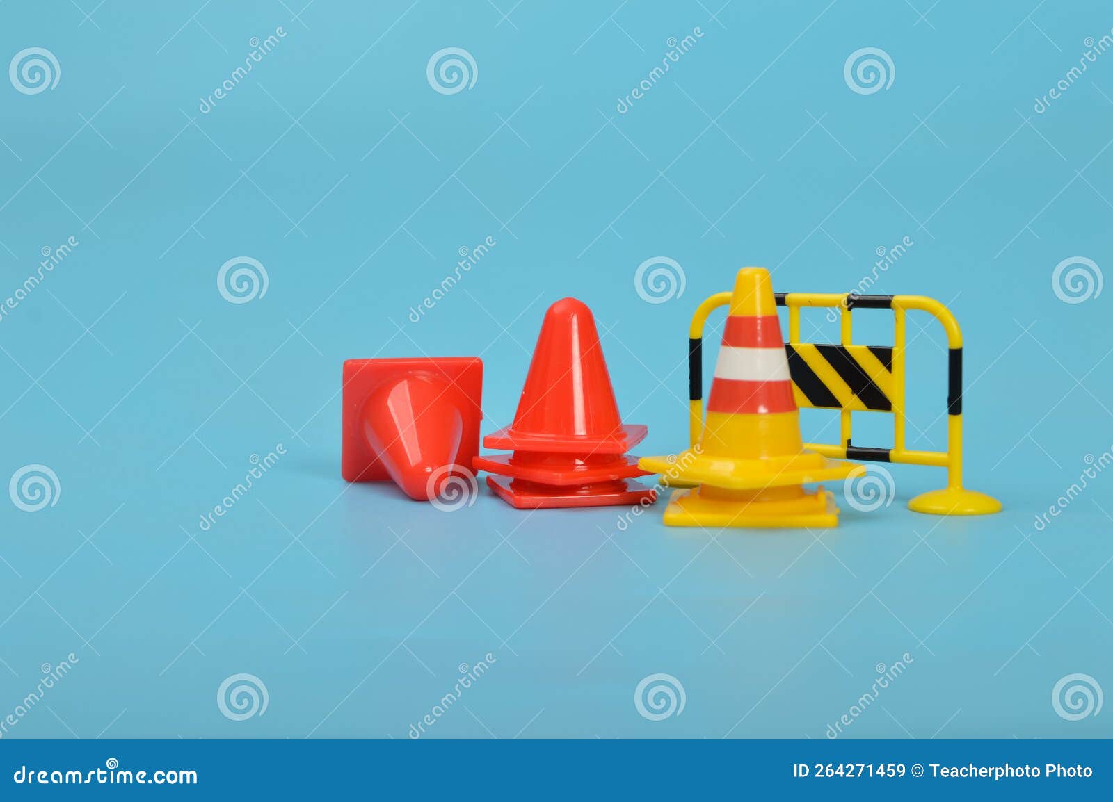 Construction Fences and Plastic Cones Isolated on a Blue Background ...