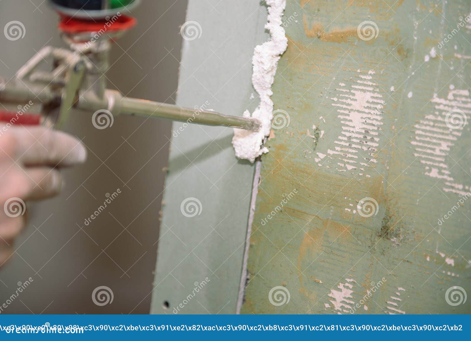 Construction Foam. Foaming the Door Stock Photo - Image of insulating ...