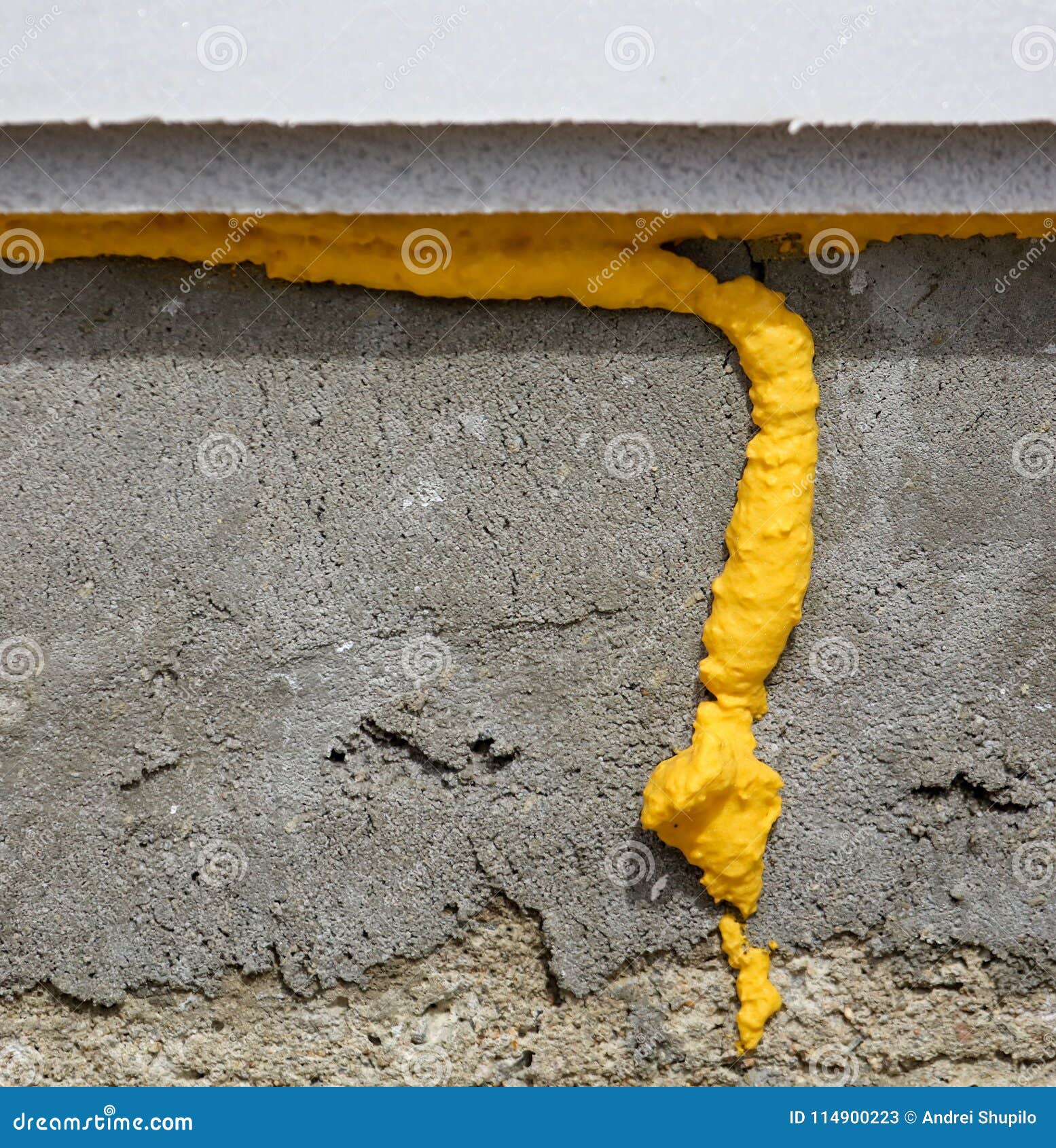 Construction Foam in the Wall Slit As a Background Stock Image - Image ...