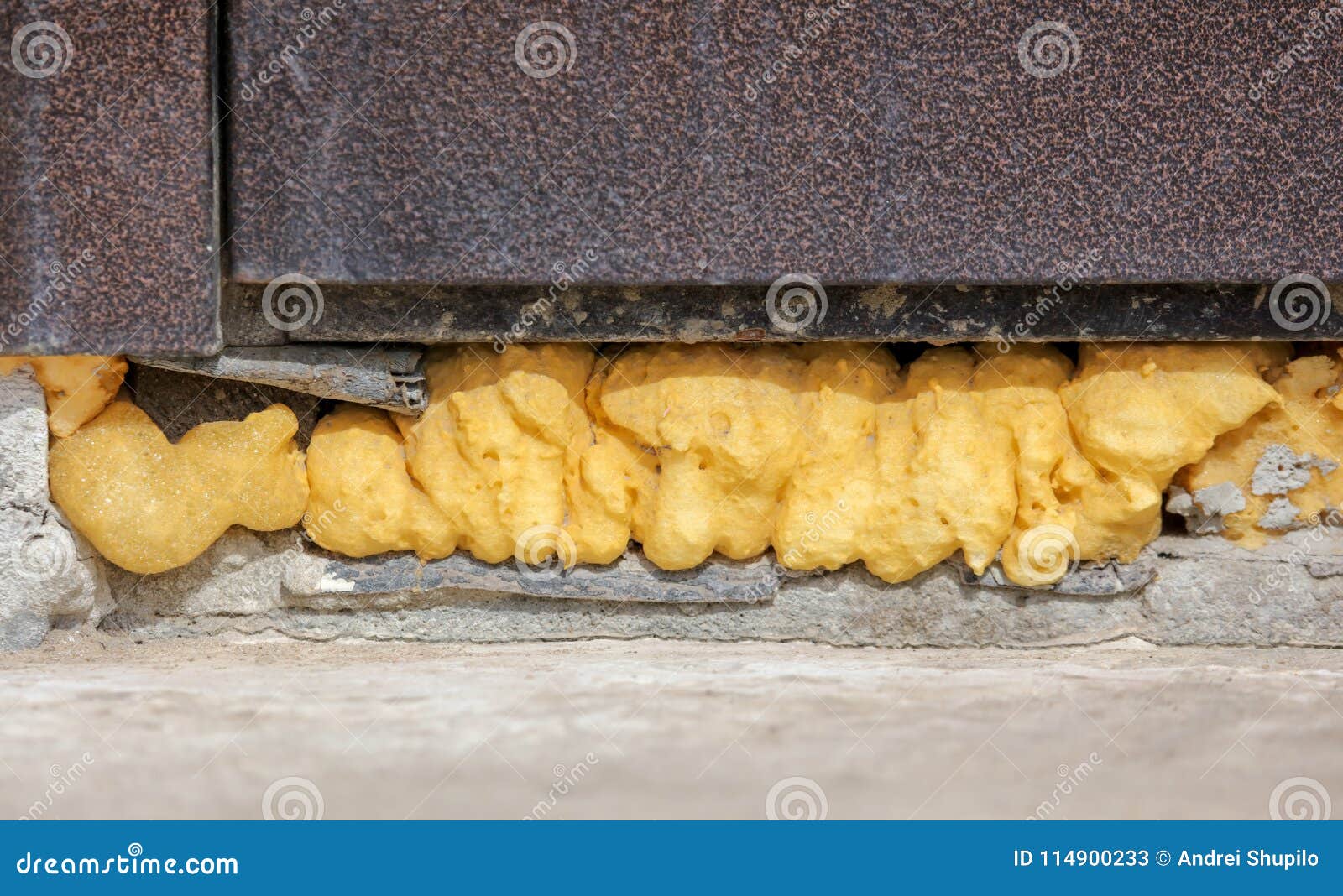 Construction Foam in the Wall Slit As a Background Stock Image - Image ...