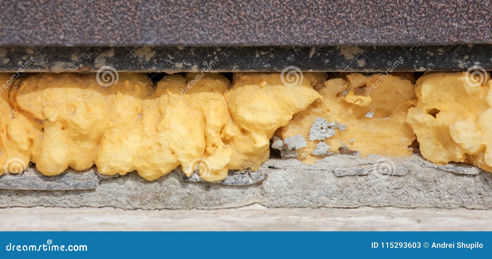 Construction Foam in the Wall Slit As a Background Stock Image - Image ...