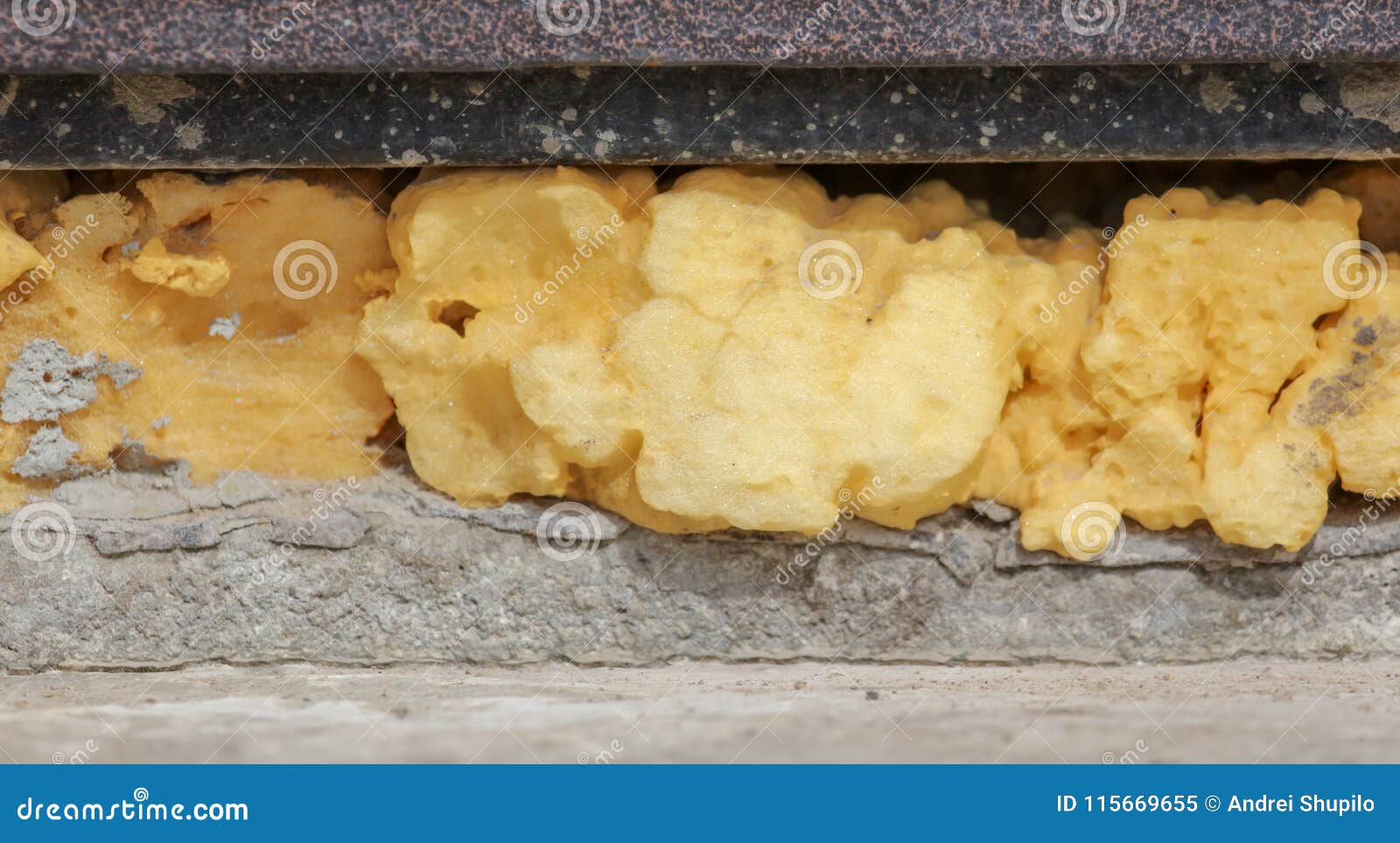 Construction Foam in the Wall Slit As a Background Stock Image - Image ...