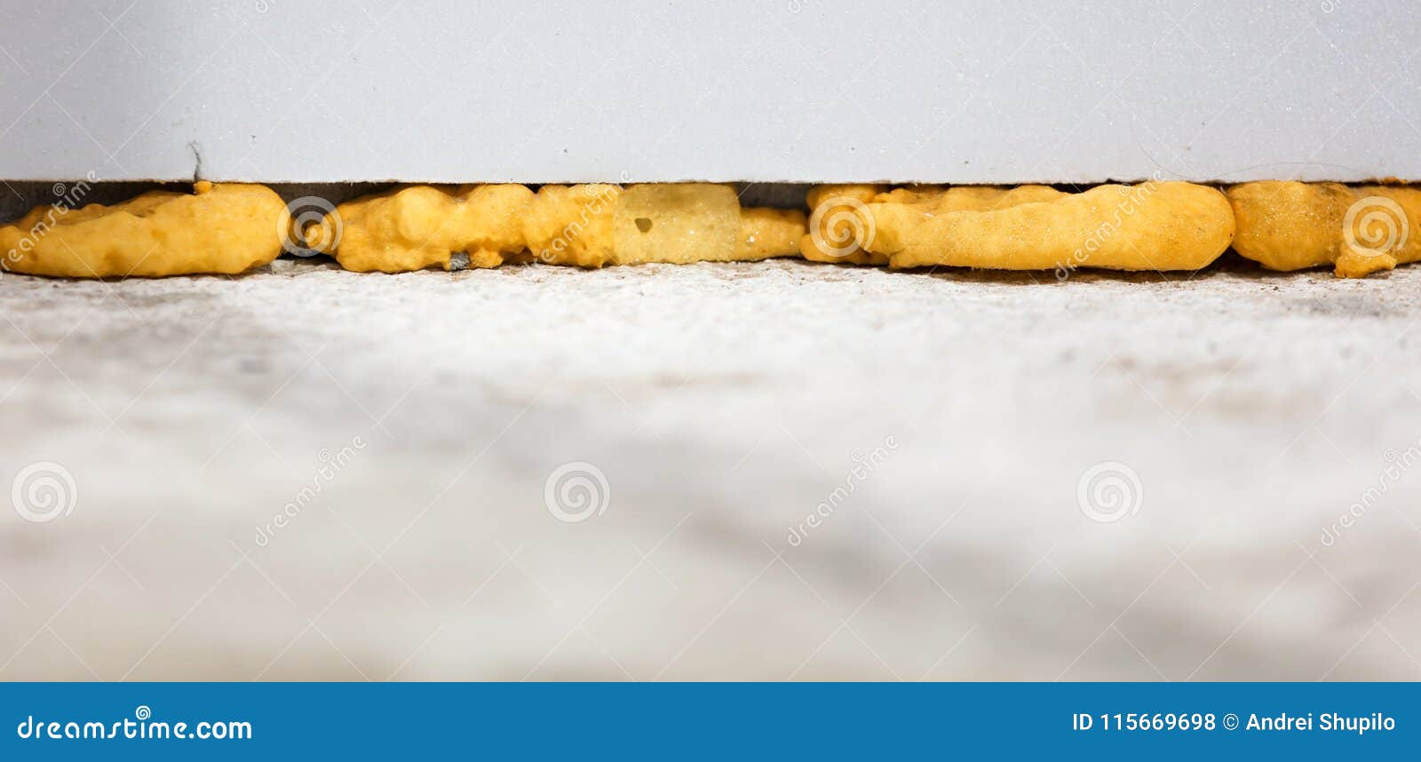 Construction Foam in the Wall Slit As a Background Stock Photo - Image ...