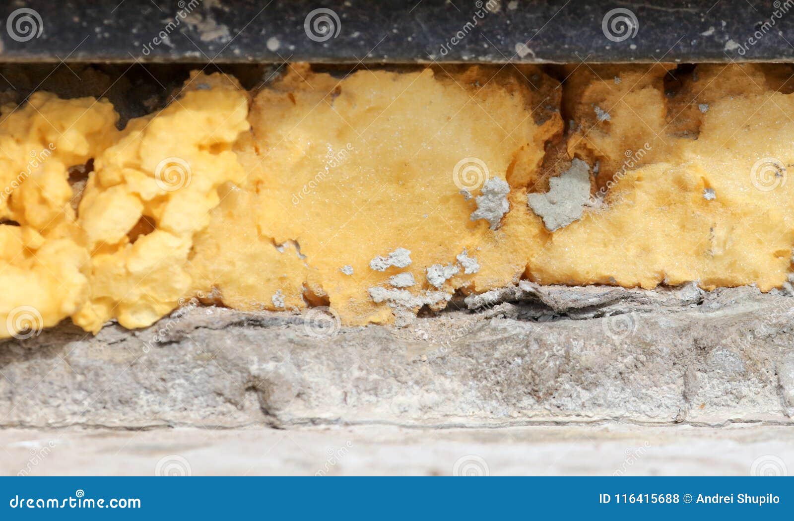 Construction Foam in the Wall Slit As a Background Stock Photo - Image ...