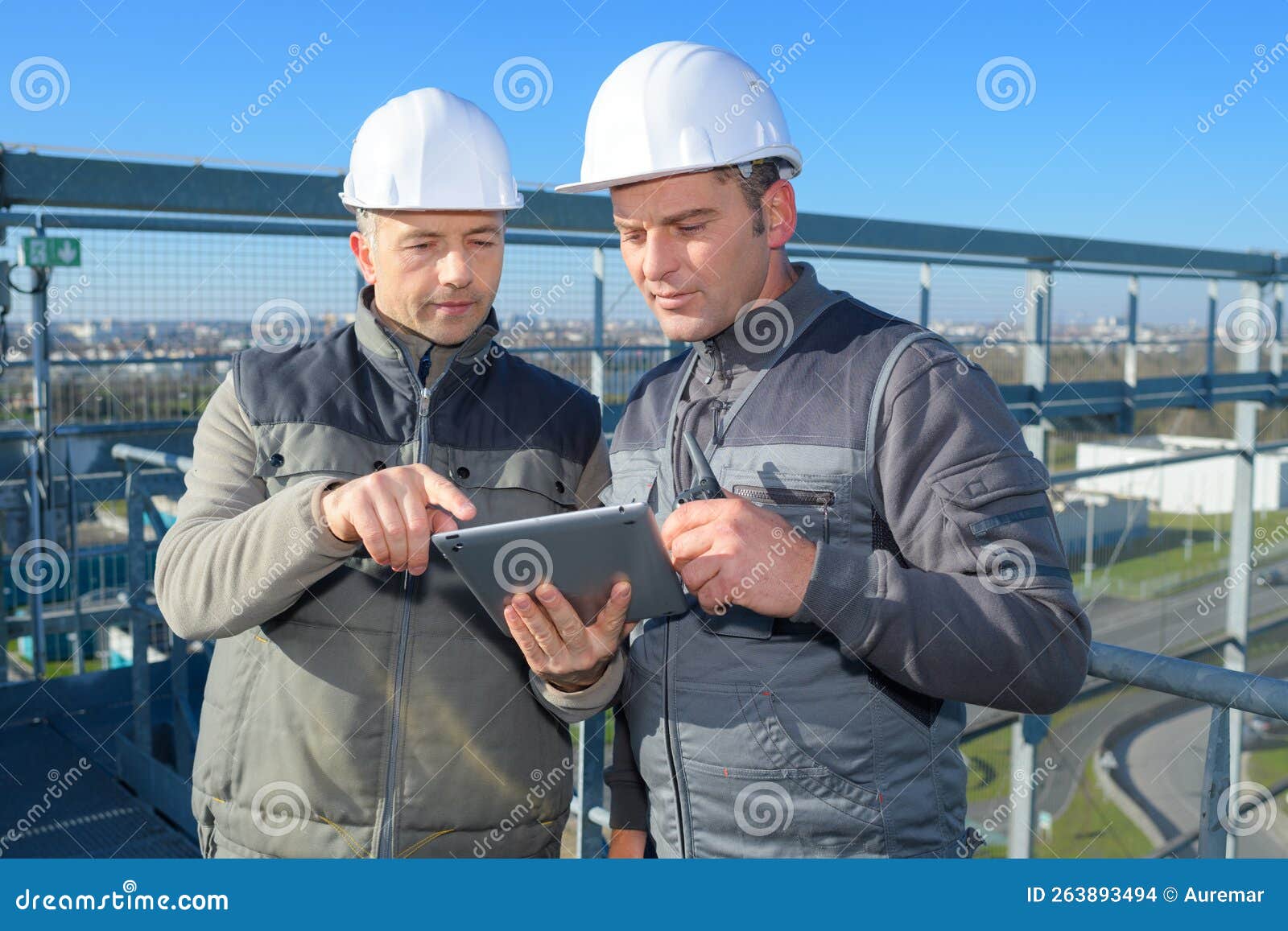 Construction Foreman Looking at Tablet Stock Photo - Image of ...