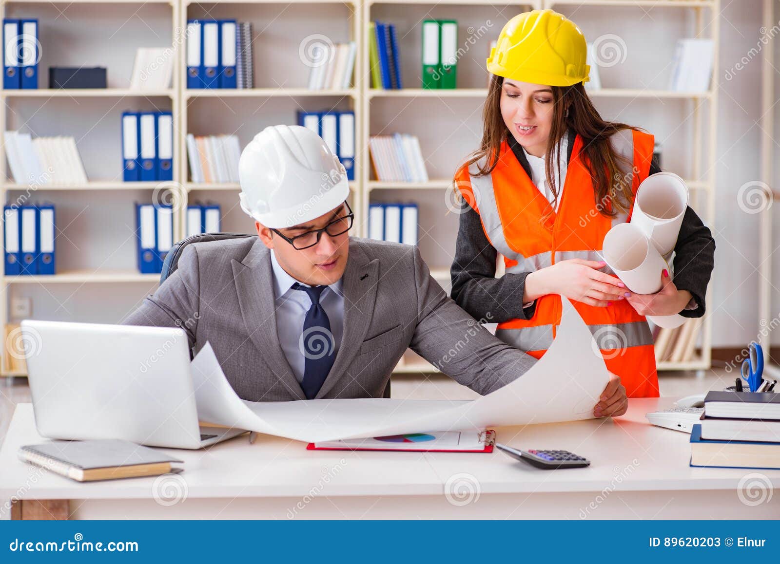 The Construction Foreman Supervisor Reviewing Drawings Stock Image ...