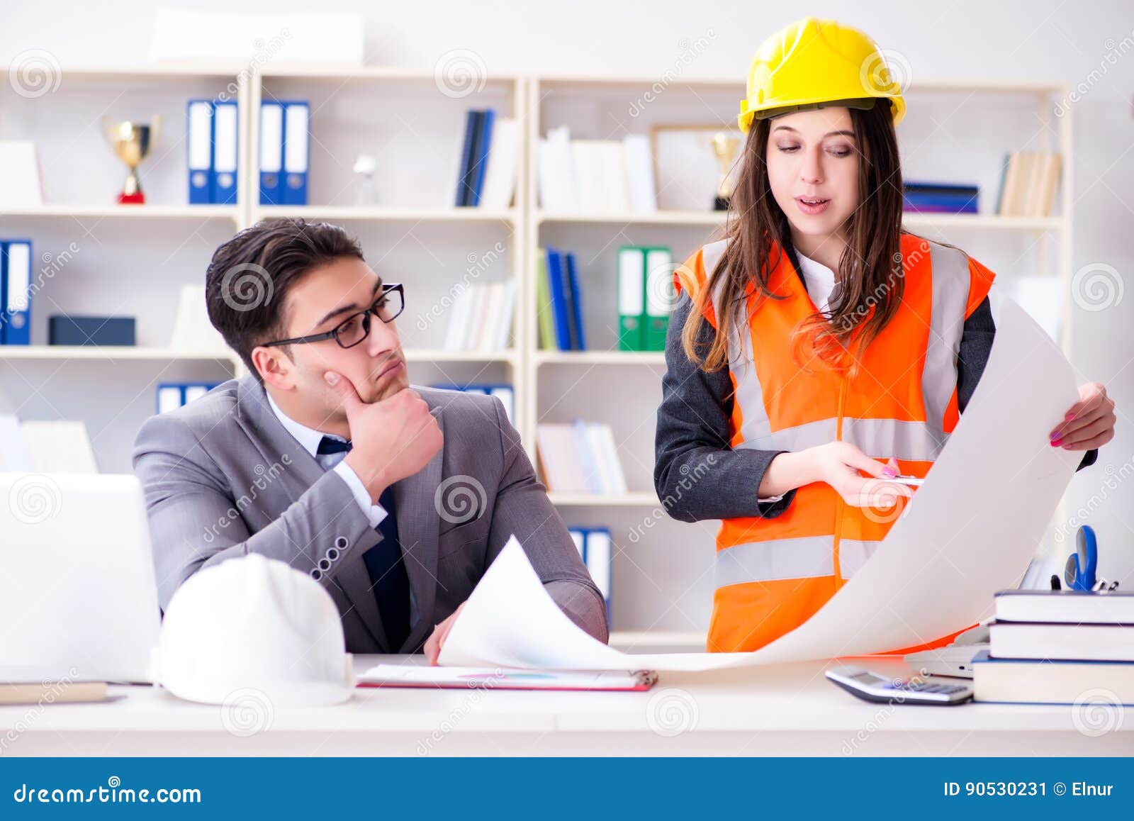 The Construction Foreman Supervisor Reviewing Drawings Stock Image ...