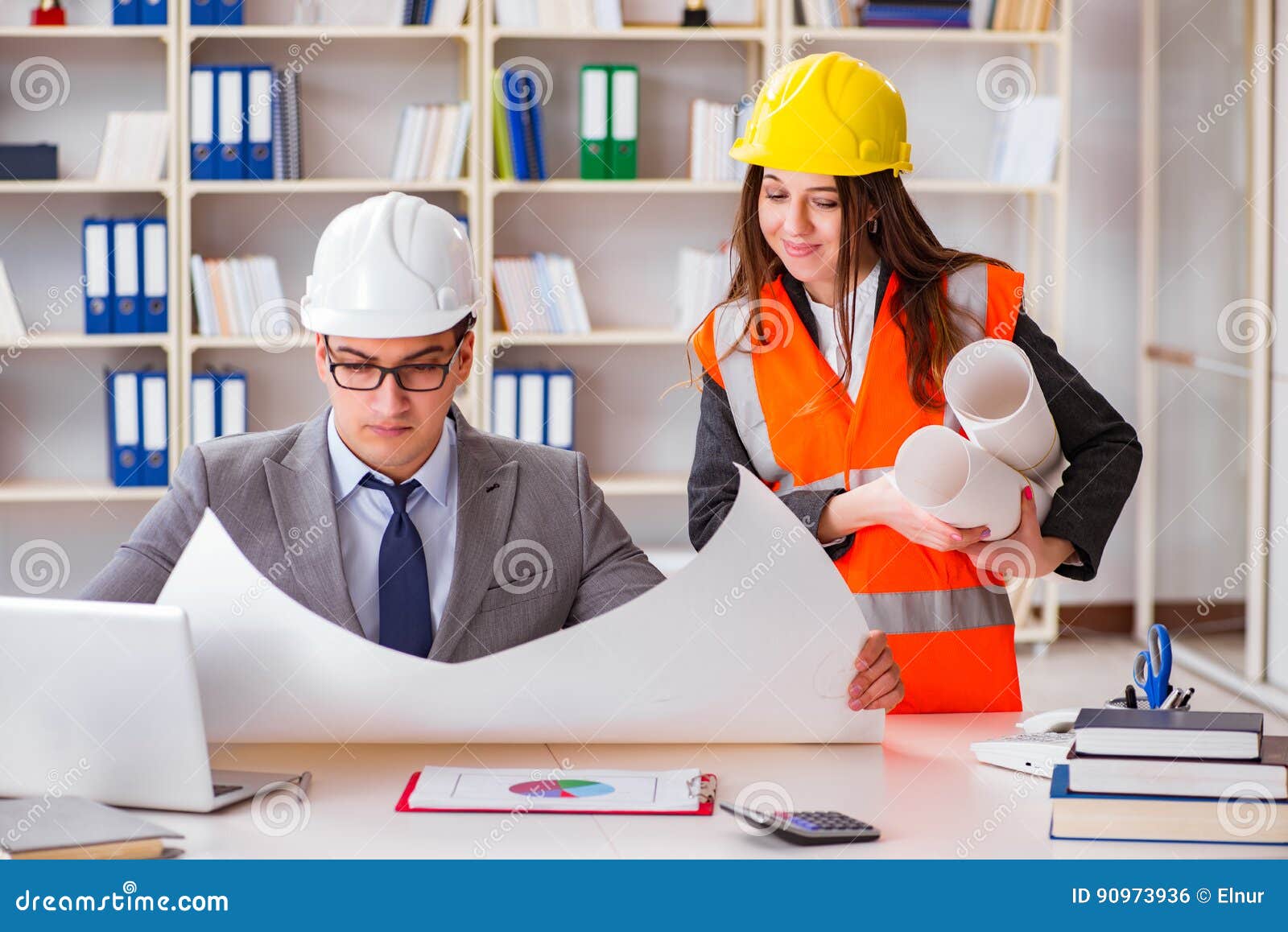 The Construction Foreman Supervisor Reviewing Drawings Stock Photo ...