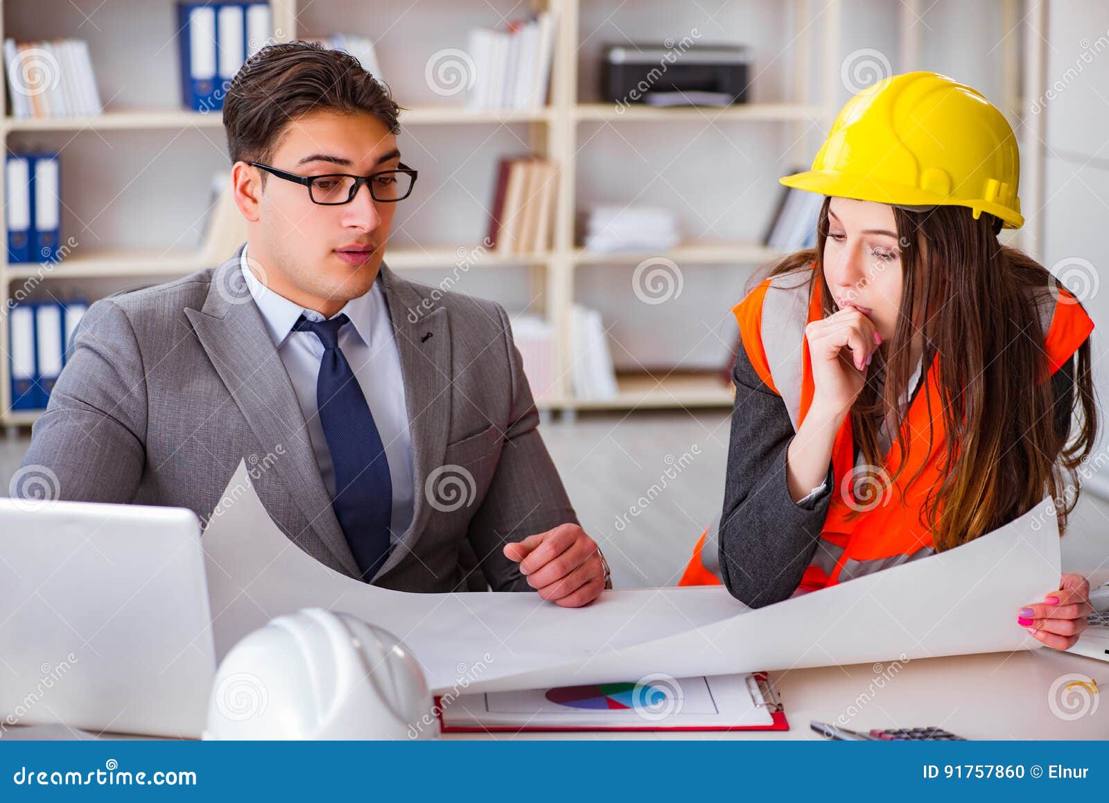 The Construction Foreman Supervisor Reviewing Drawings Stock Photo ...
