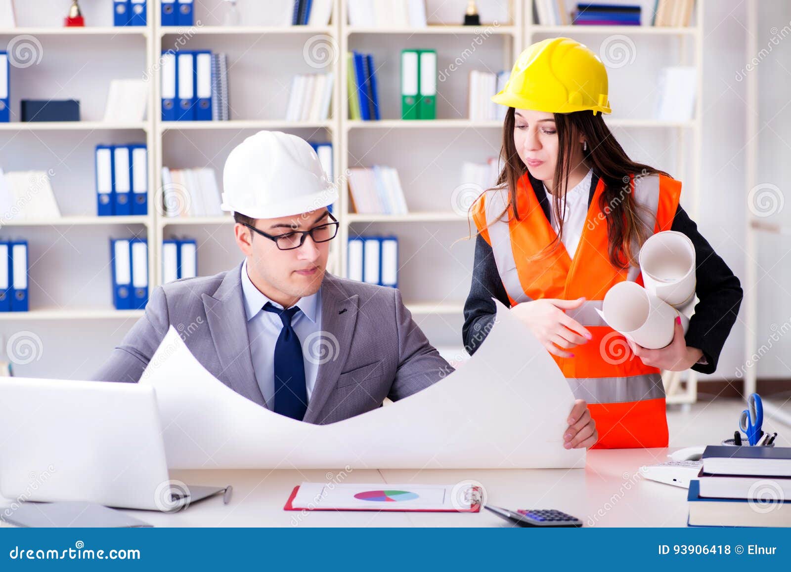 The Construction Foreman Supervisor Reviewing Drawings Stock Photo ...