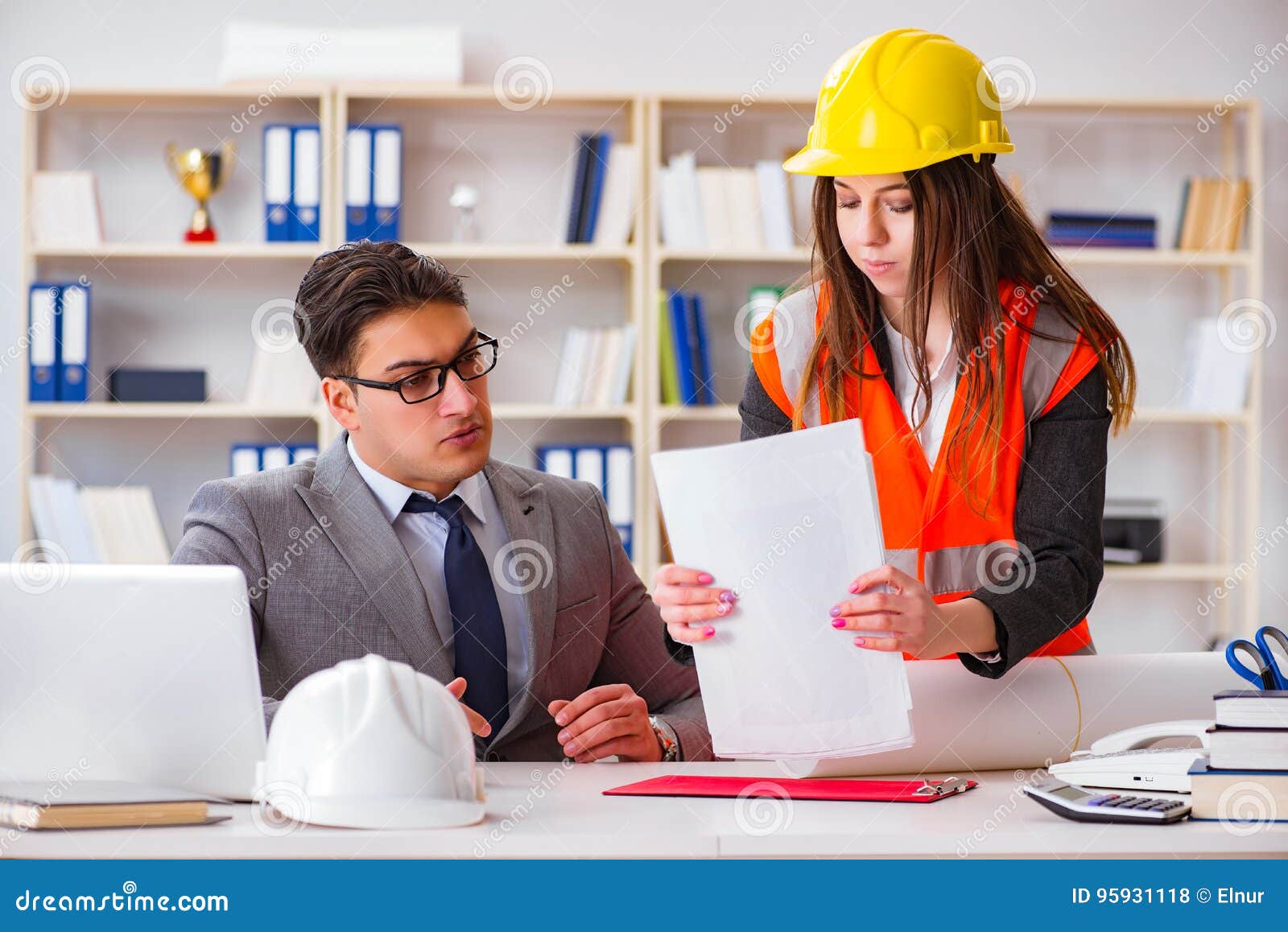 The Construction Foreman Supervisor Reviewing Drawings Stock Photo ...
