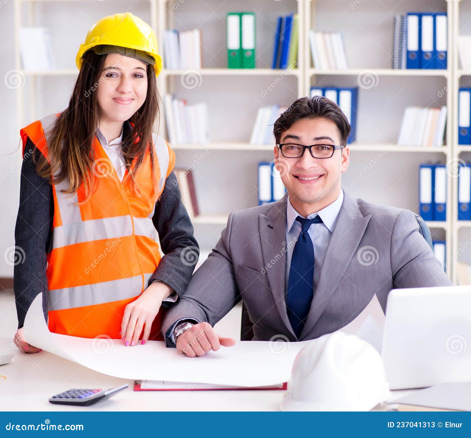 Construction Foreman Supervisor Reviewing Drawings Stock Image - Image ...
