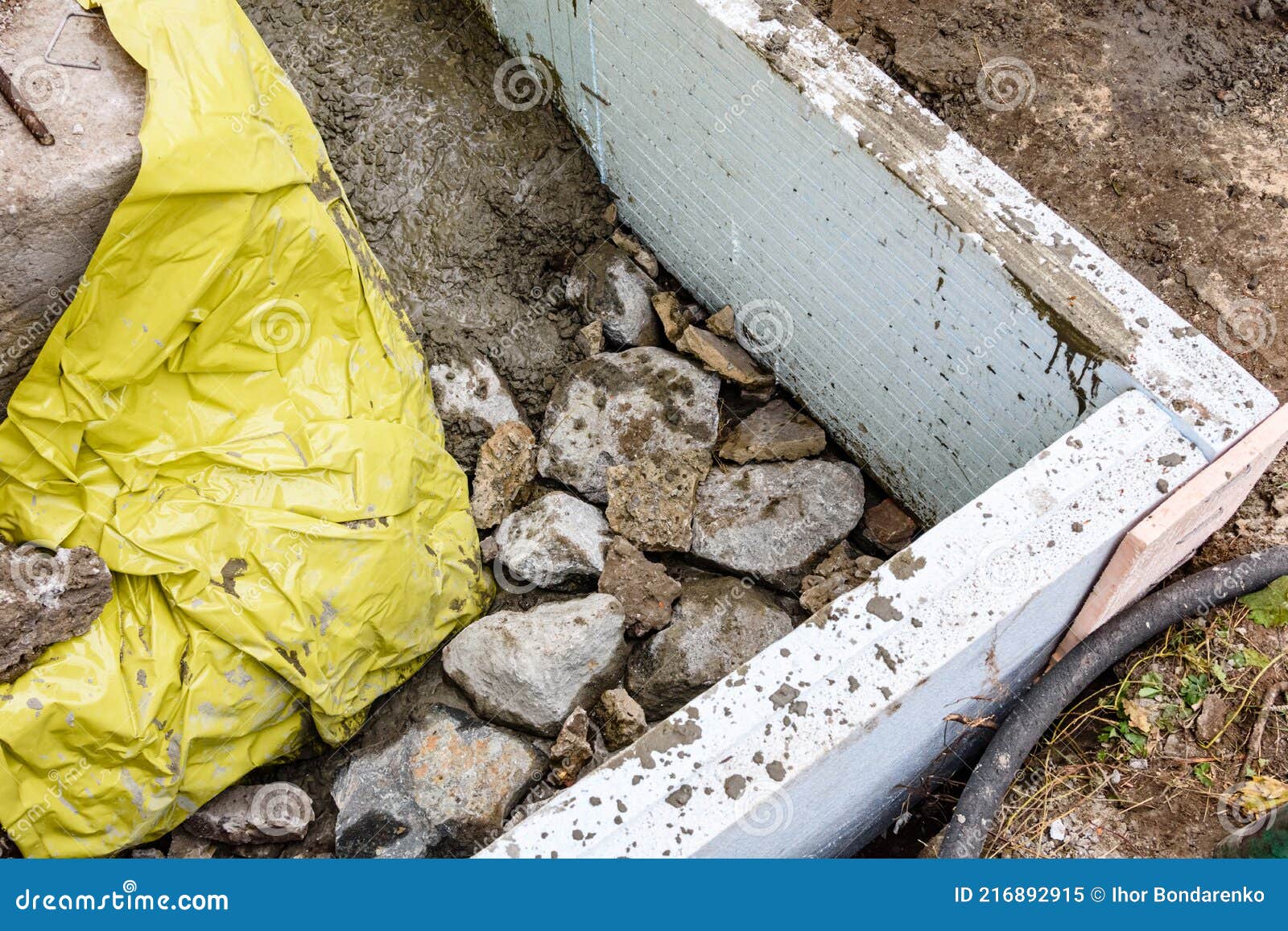 Construction of the Foundation for House. Pouring of Concrete Stock ...