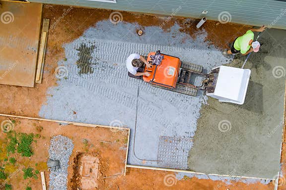 Construction of Foundation Involves Pouring of Wet Cement into ...
