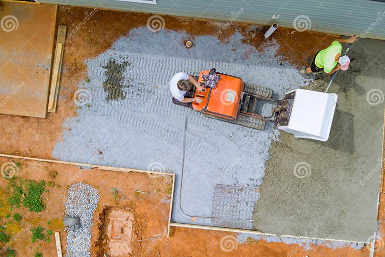 Construction of Foundation Involves Pouring of Wet Cement into ...