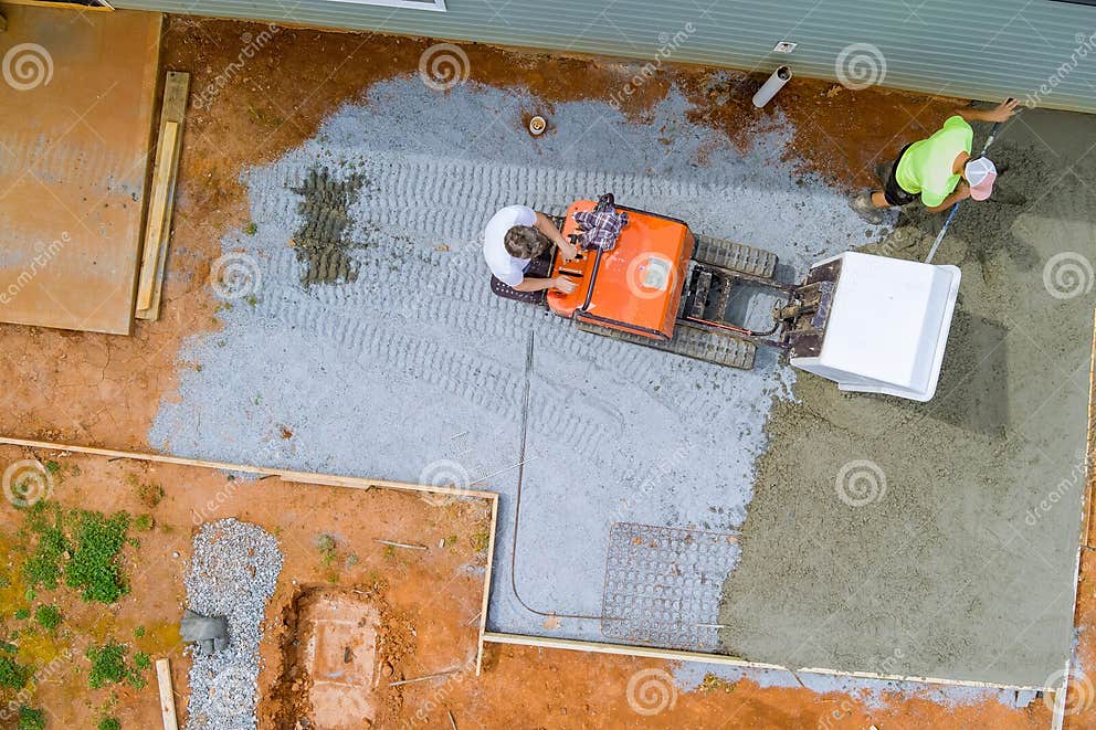 Construction of Foundation Involves Pouring of Wet Cement into ...