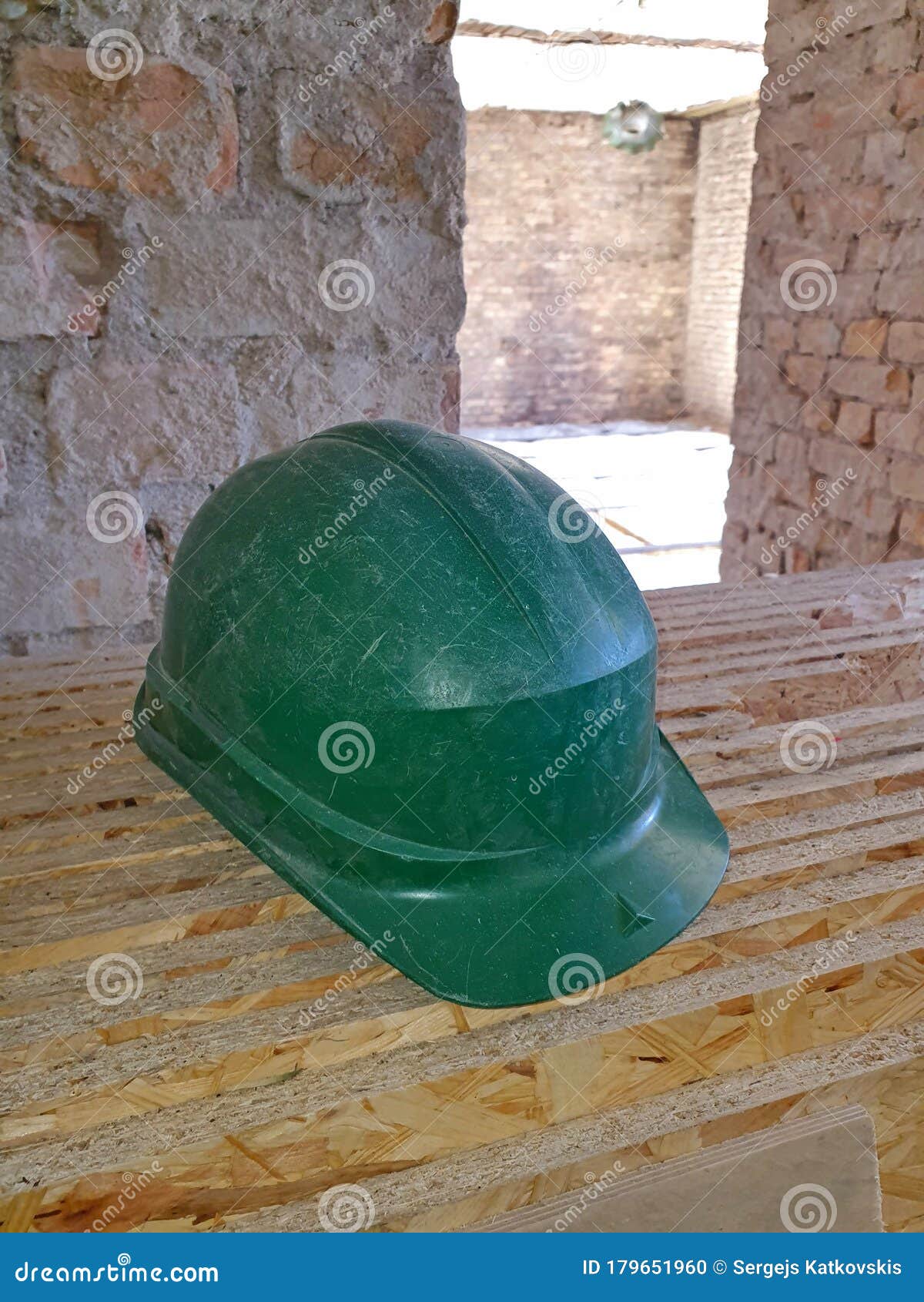 Construction Helmet on a Brick Wall Stock Photo - Image of builder ...