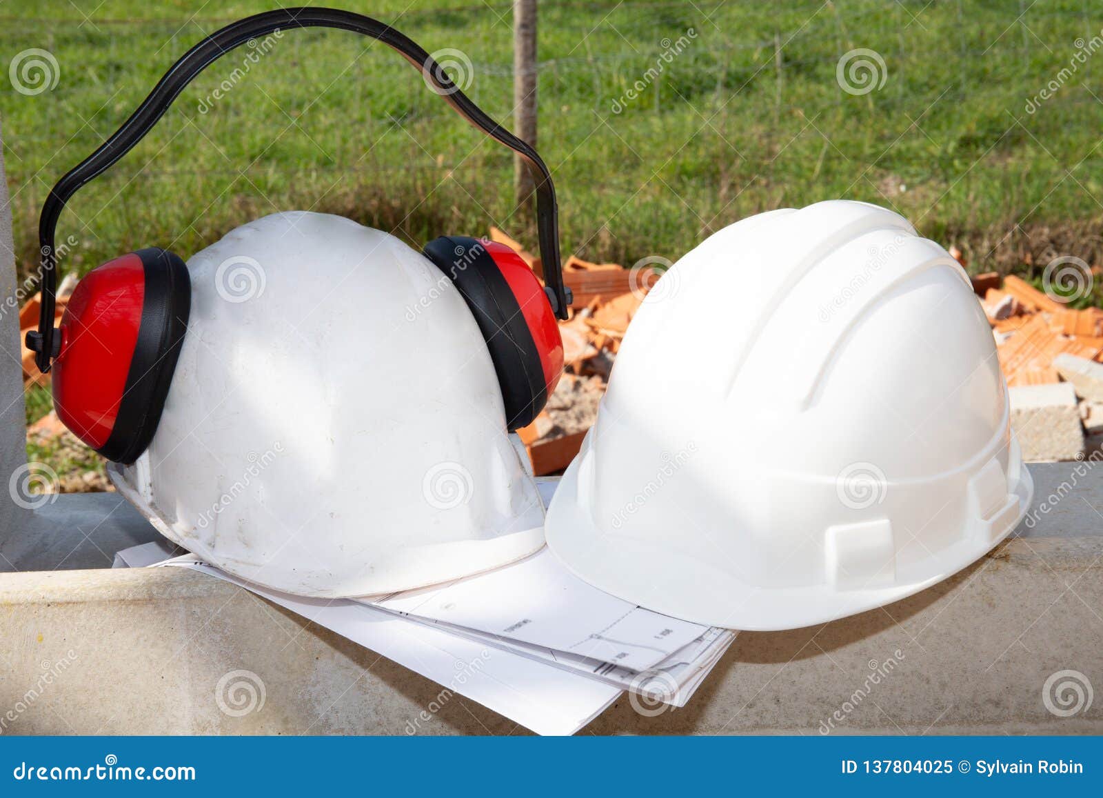 Two Construction Helmet Placed on a Wall Under Construction Stock Image ...