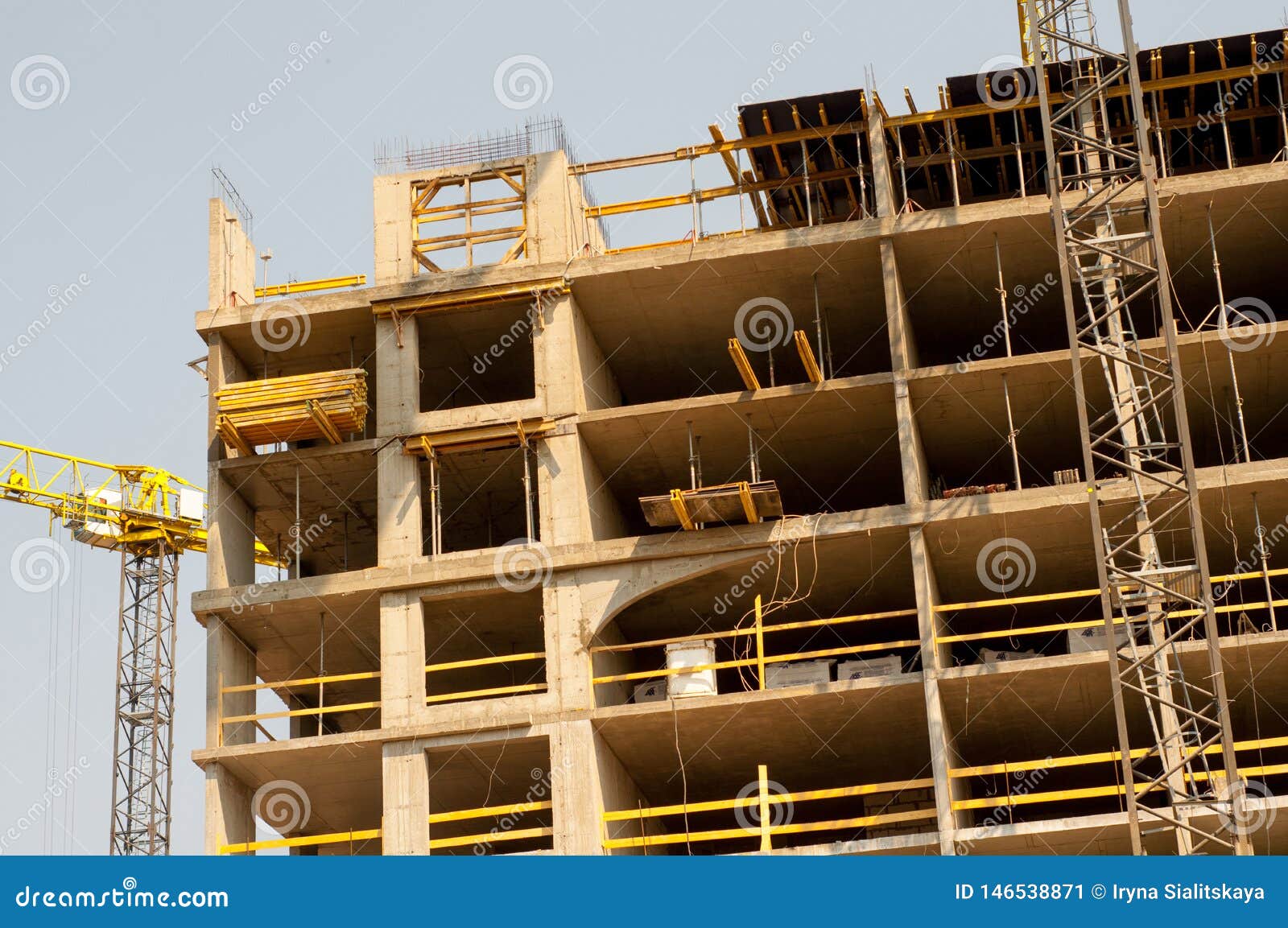 Construction of a High-rise Building with a Crane. Building ...