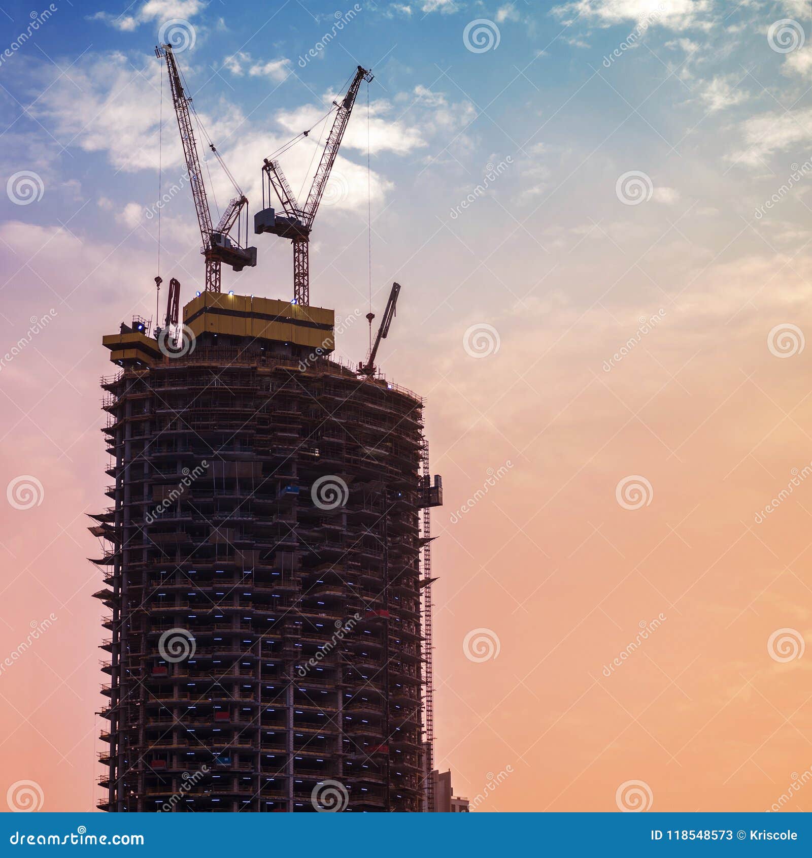 Construction of High-rise Building. Construction Cranes and Skyscraper ...