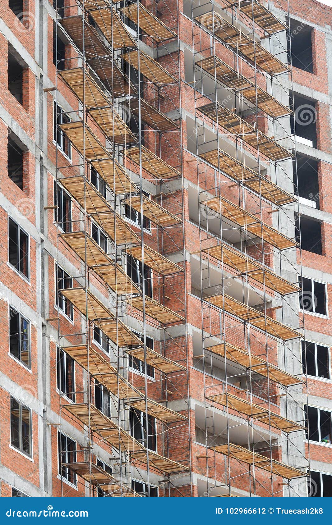 Construction of High-rise Building with Scaffolds Stock Photo - Image ...
