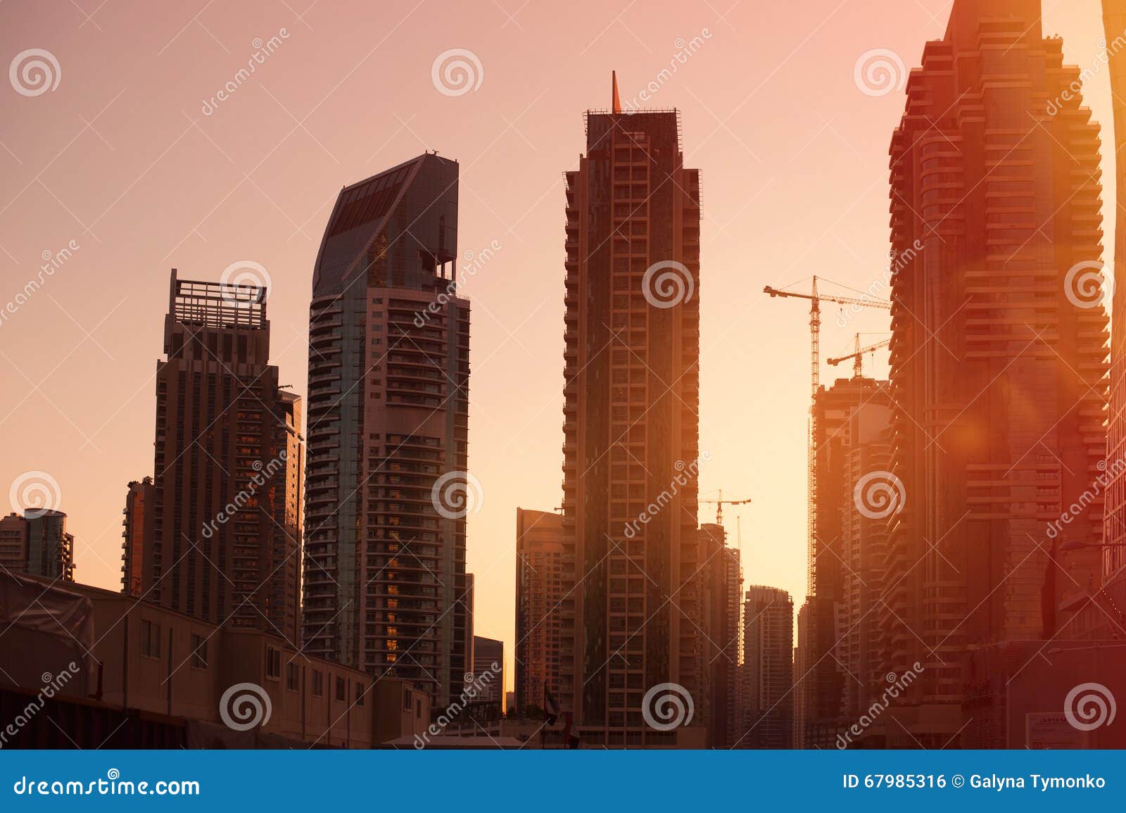 Construction of High-rise Buildings on Background Sunrise Stock Photo ...