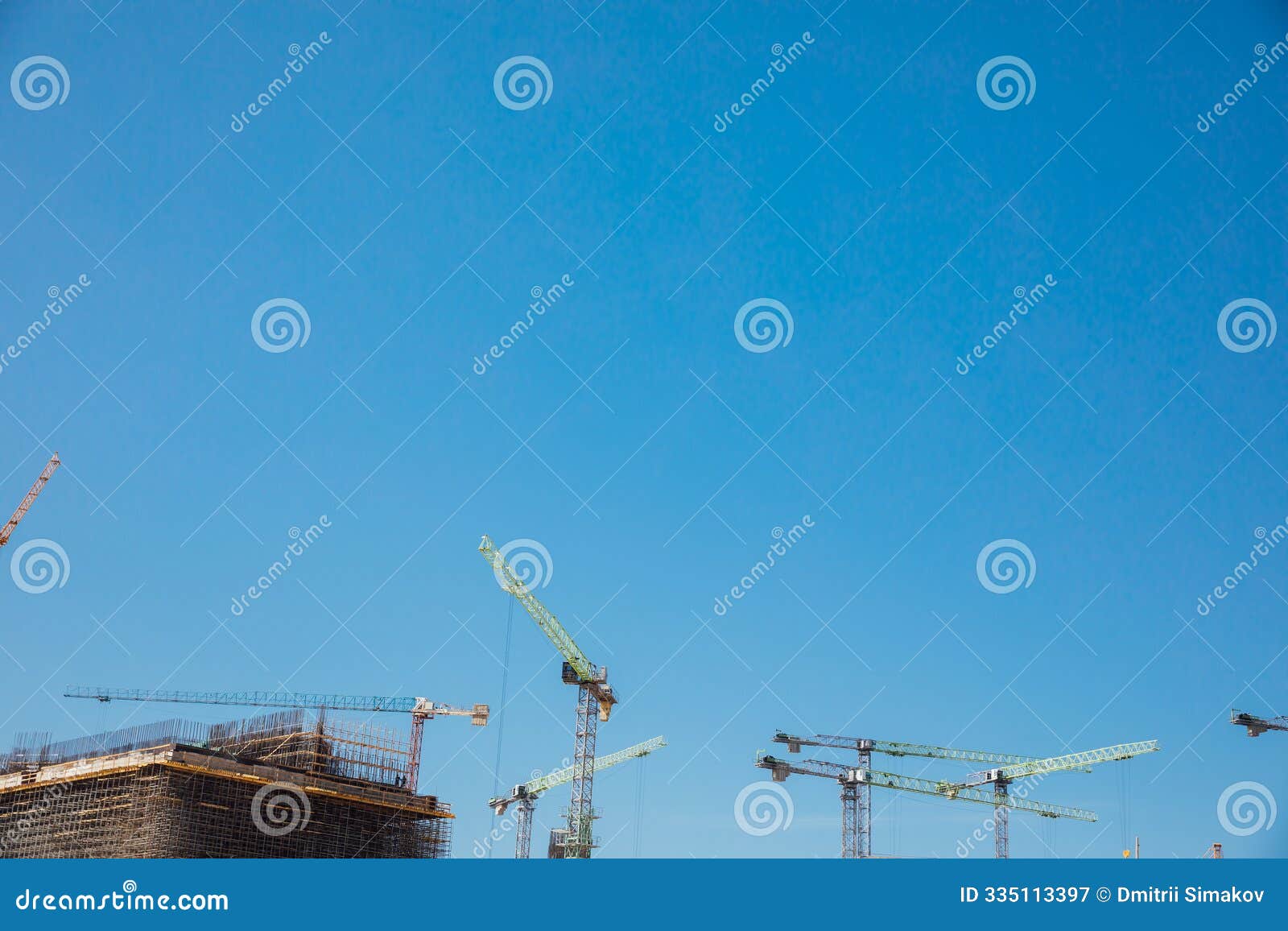 Construction High Rise Cranes on Blue Sky Background Stock Image ...