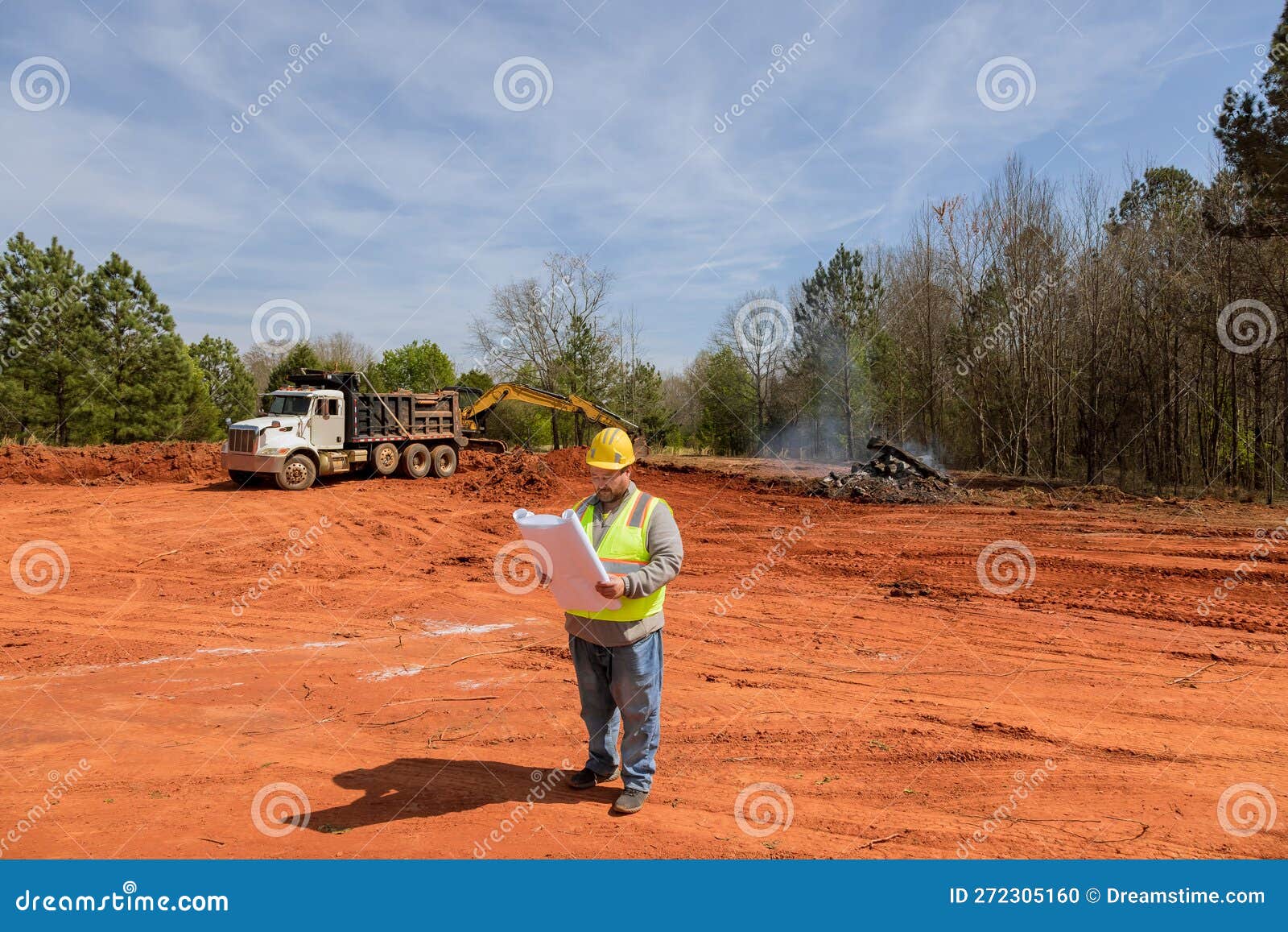 During Construction on a House Project, a Supervisor in a Hard Hat ...