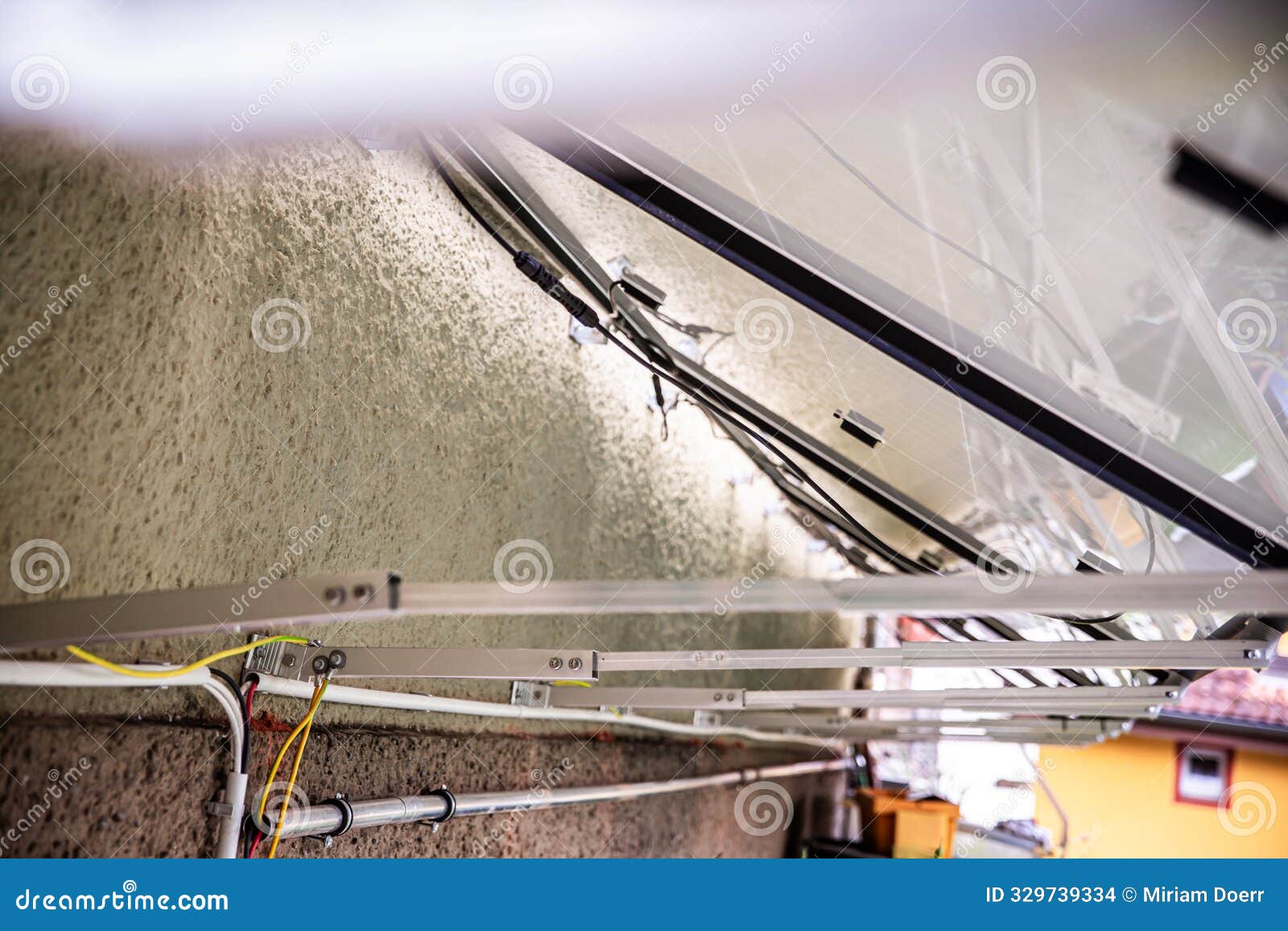 Construction on a House Wall To Install Pv or Photovoltaic Modules ...