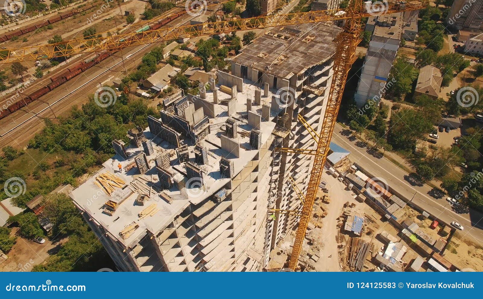 Construction of Houses. Drone Fly Over Construction Site with Tower ...