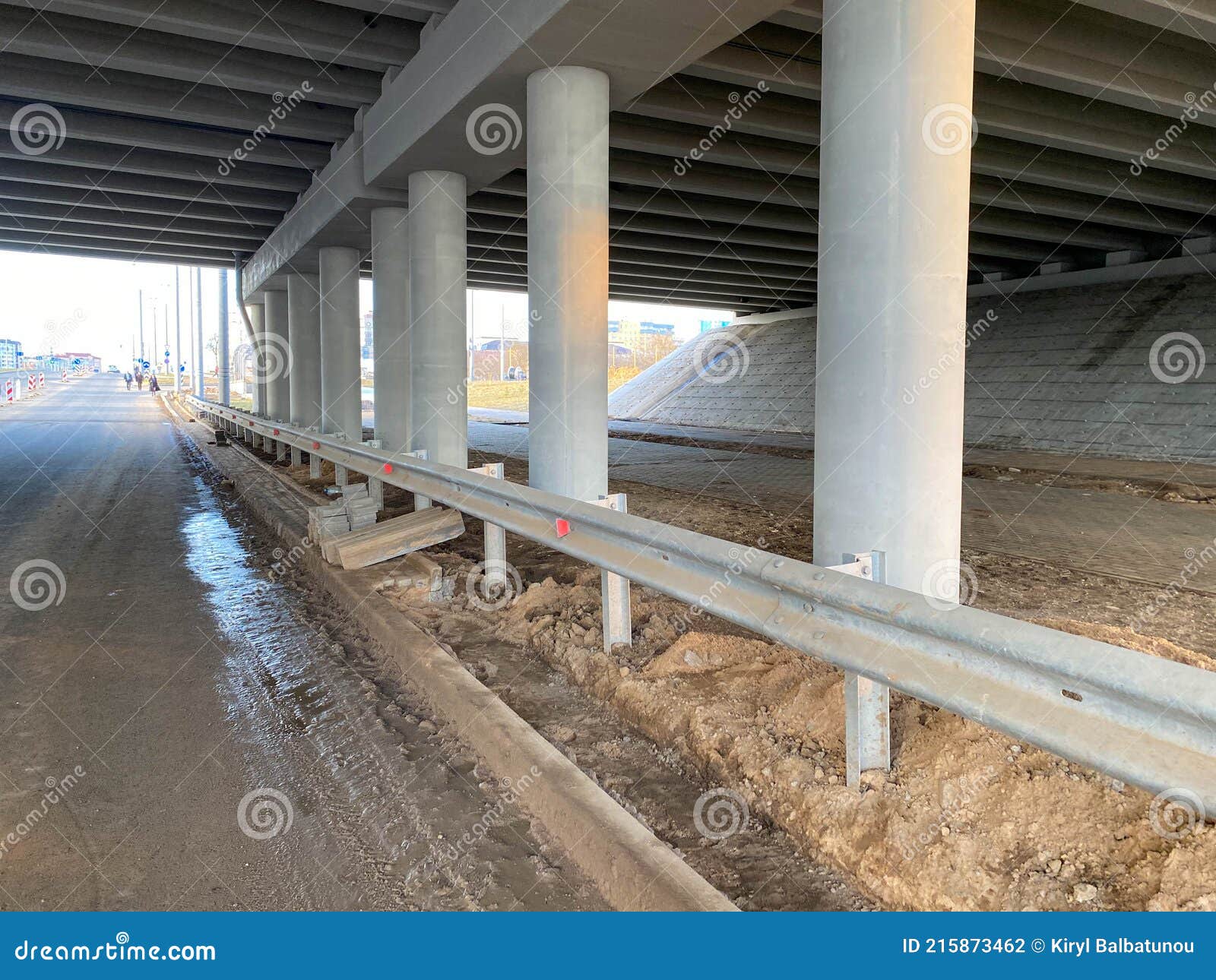 Construction Industrial Work Under a Bridge with Columns and Bumpers ...