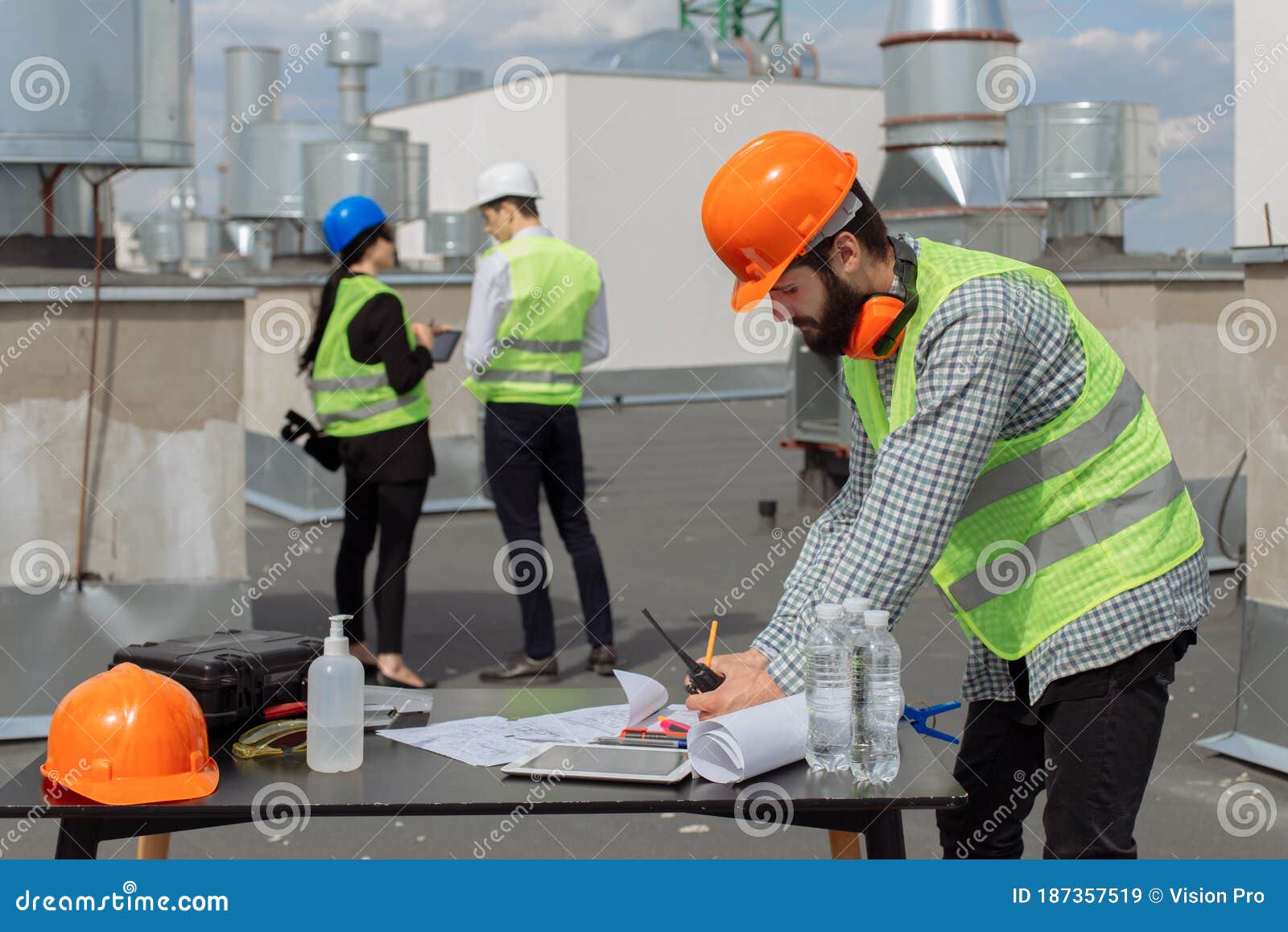 Construction Industry Group of Engineer and Architect Analyzing the ...
