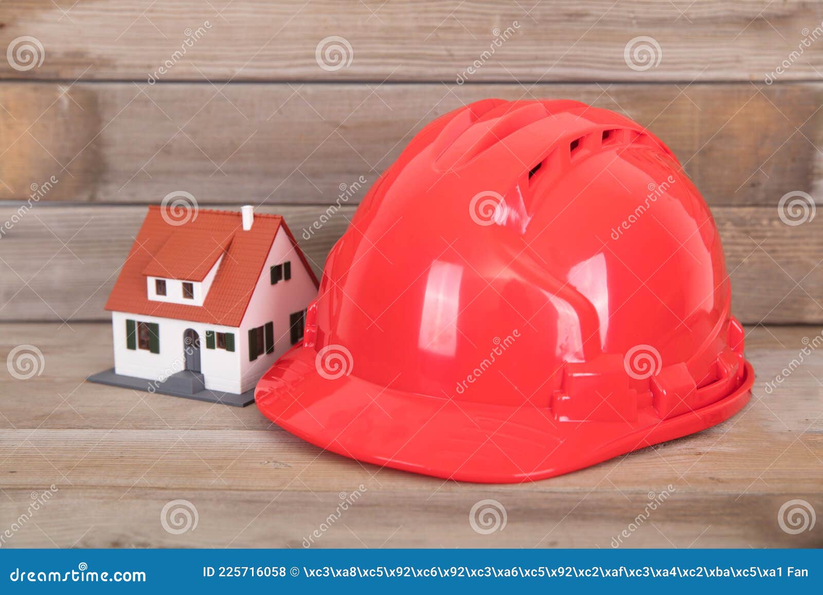 Construction Industry Red Hard Hat and Small House Model Stock Photo ...