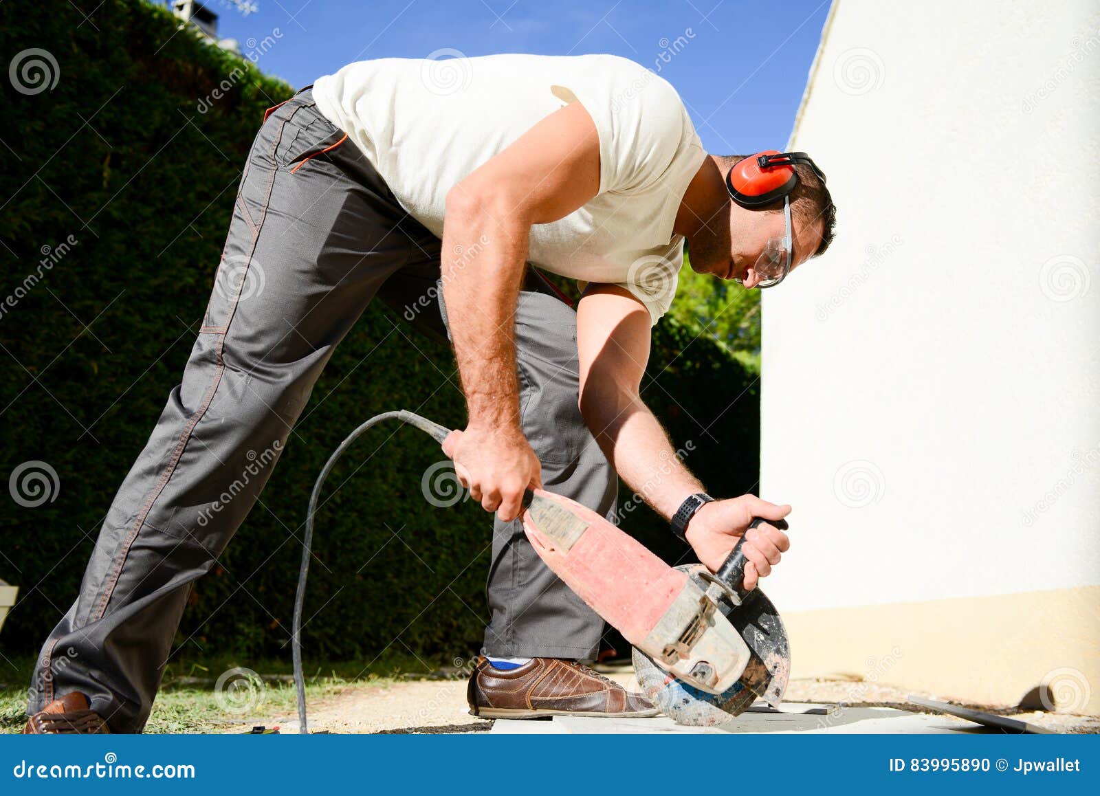 Construction Industry Worker with Tools in a Construction Site Stock ...