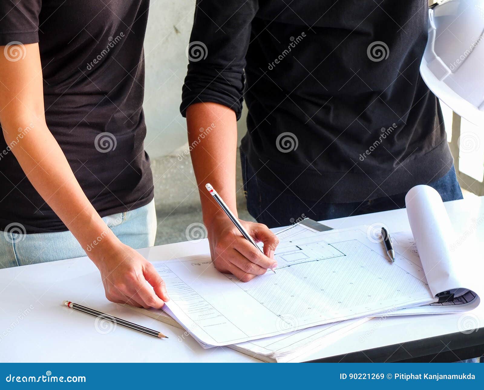Engineers Are Helping To Design Work On Blueprints And Collaborate On ...