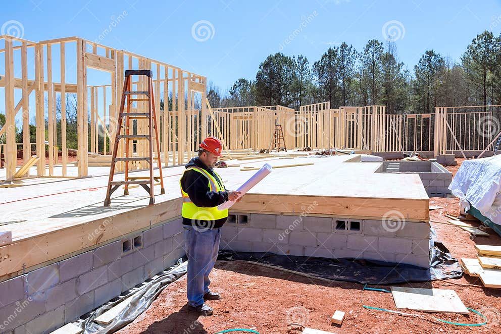 Construction Inspector Used Blueprints To Verify Quality of Work Being ...