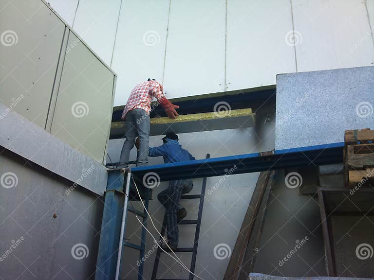 Construction Installation stock photo. Image of capping - 46236720