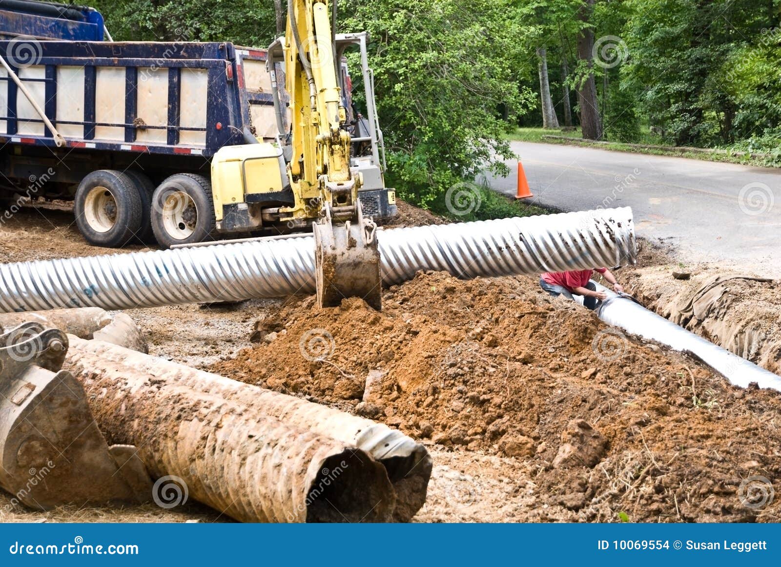 Construction/ Installing New Pipes Stock Photo - Image of laying ...