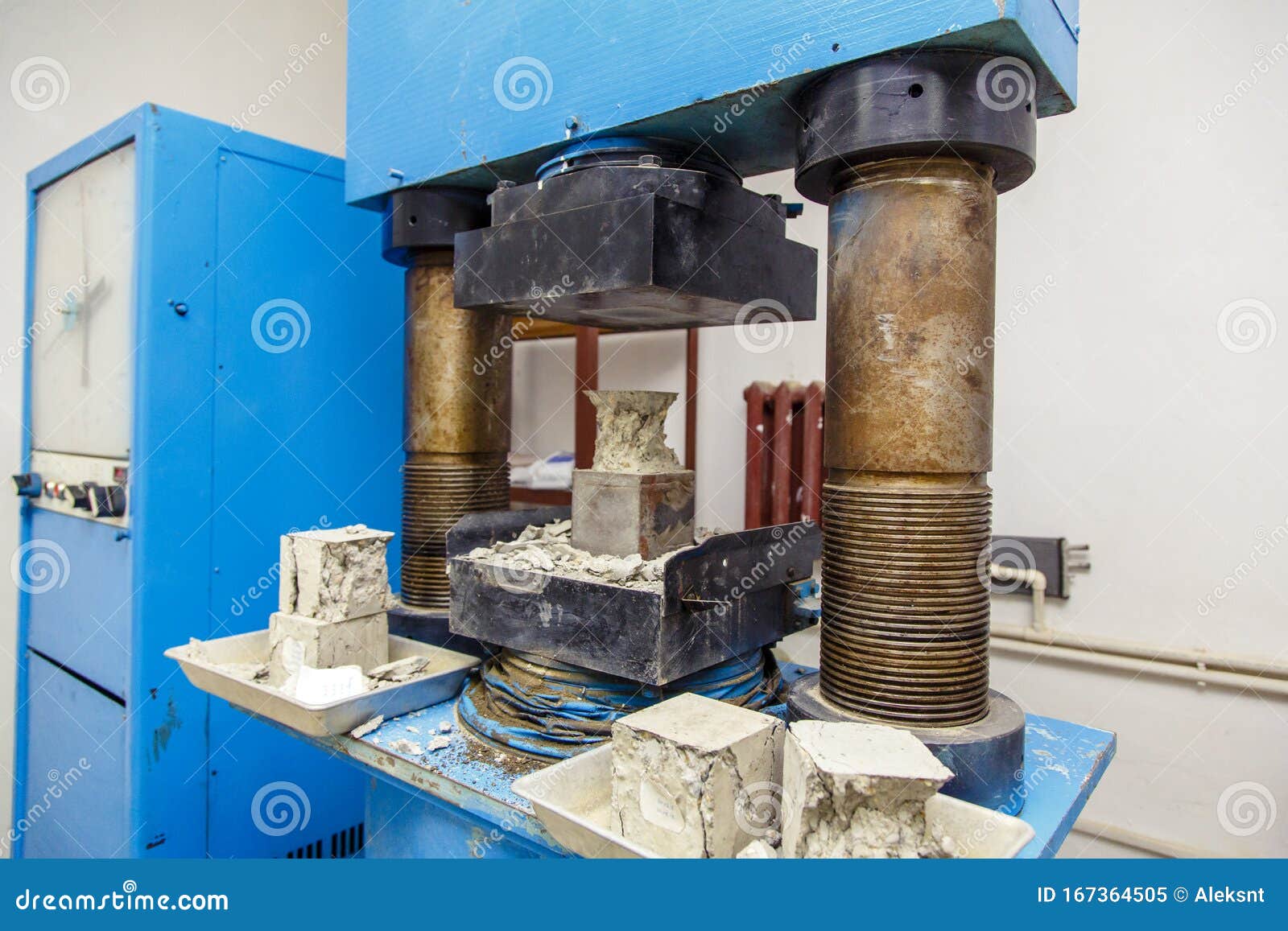 Construction Laboratory. the Press Breaks Down the Cubic Concrete ...