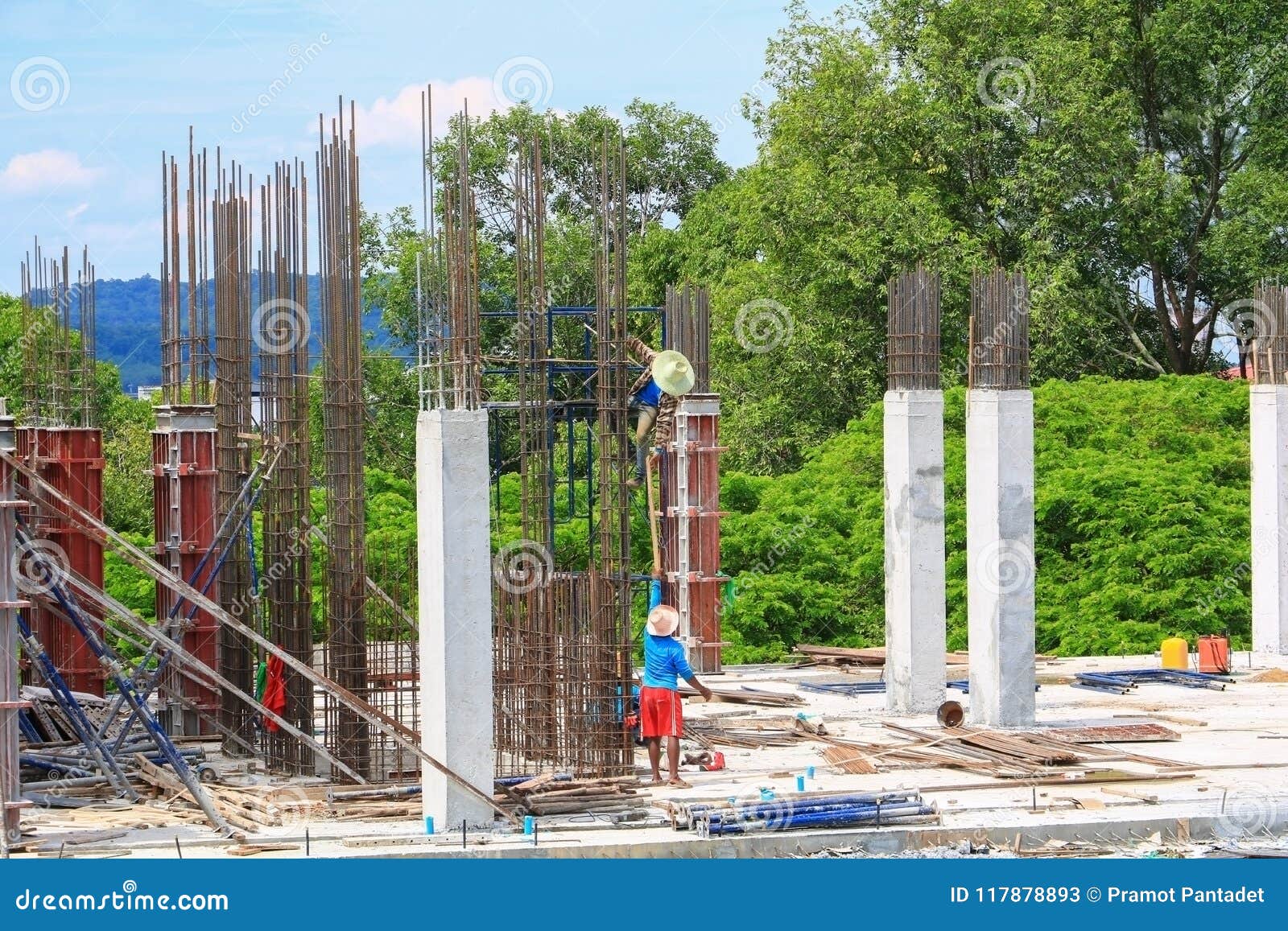 Construction Laborer Team Working on High Ground Building Commercial in ...
