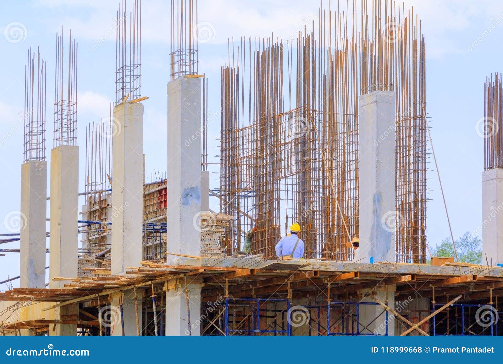 Construction Laborer Team Working on High Ground Building Commercial in ...