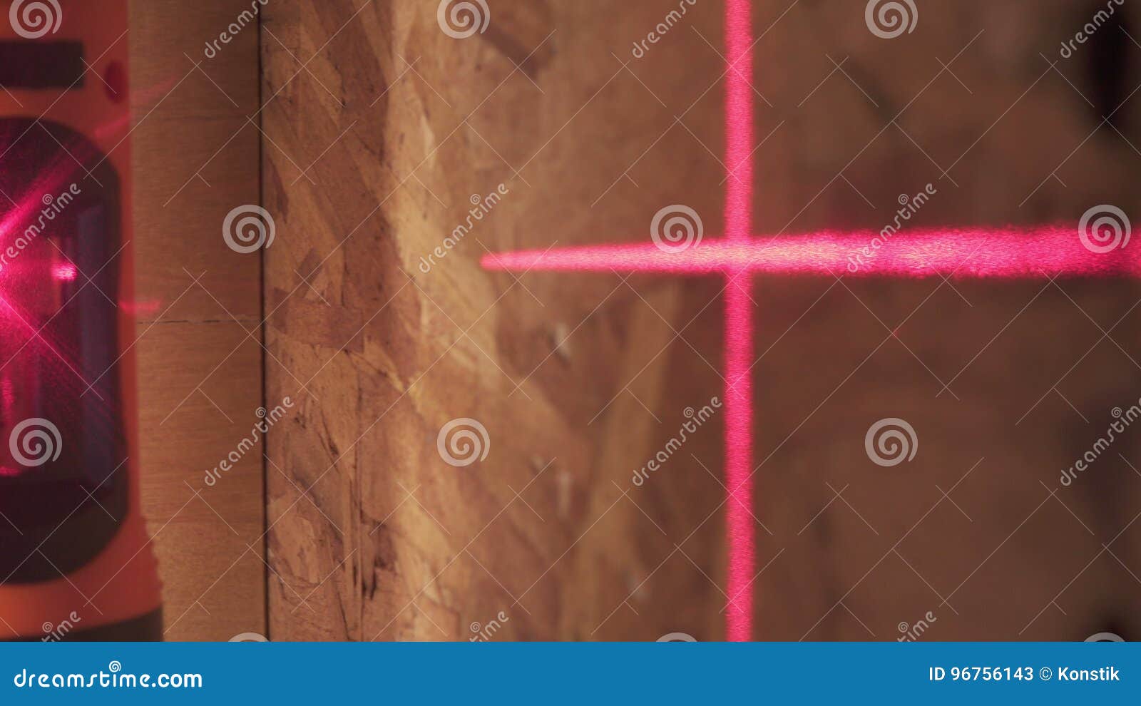 Construction Laser Level and Red Lines of a Marking on a Wall Surface ...