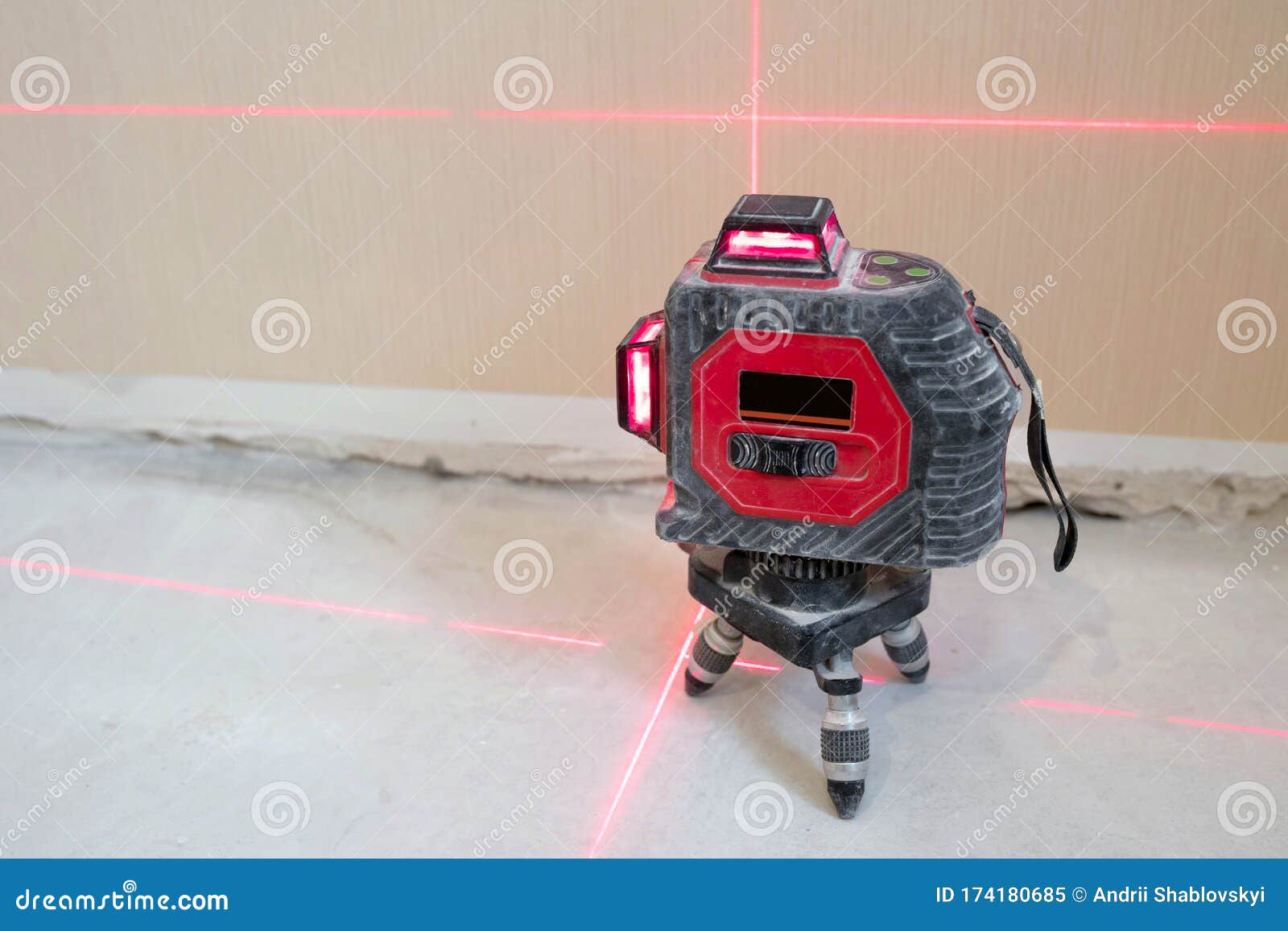 Construction Laser Level on a Wall Background. Apartment Renovation ...