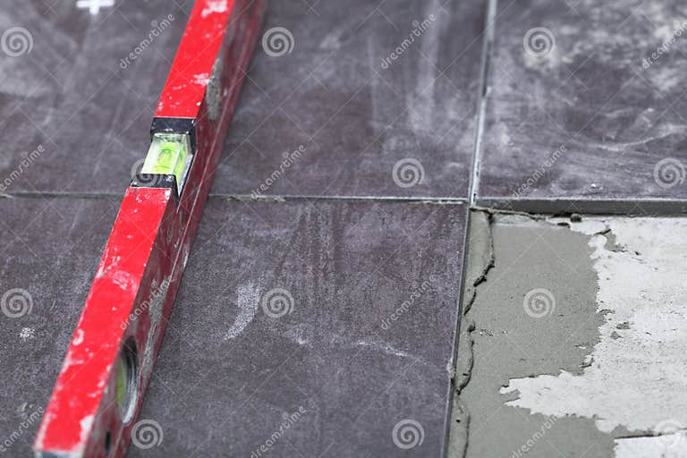 Construction Level Tiling at Home Tile Floor Adhesive Stock Image ...