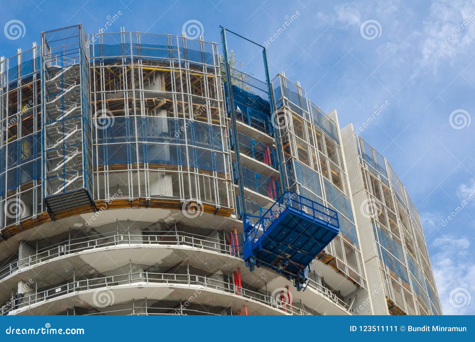 Construction Lift at Scaffolding on Building Site. Stock Image - Image ...