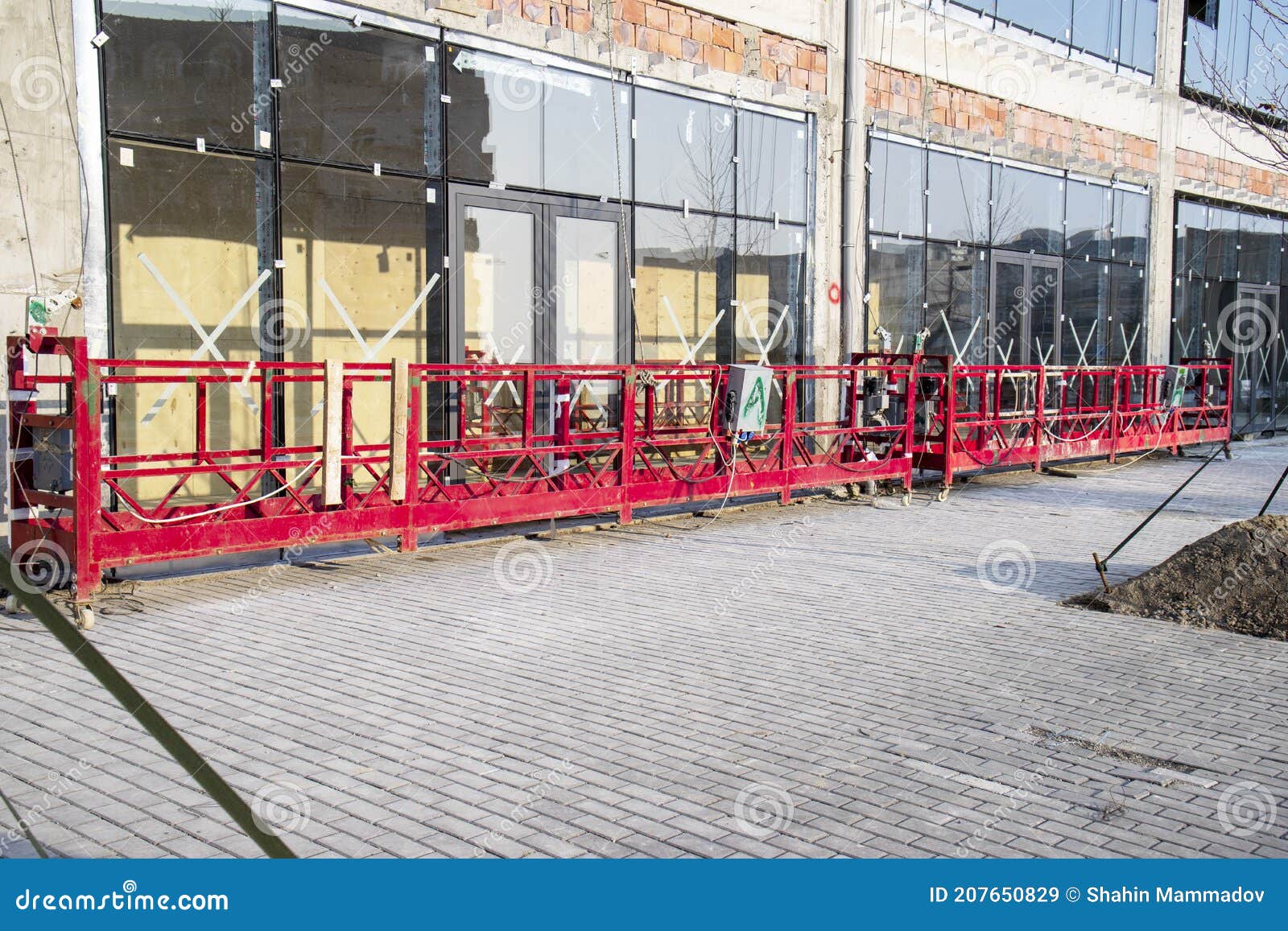 Construction Lift for Working on the Walls of the House. View of the ...