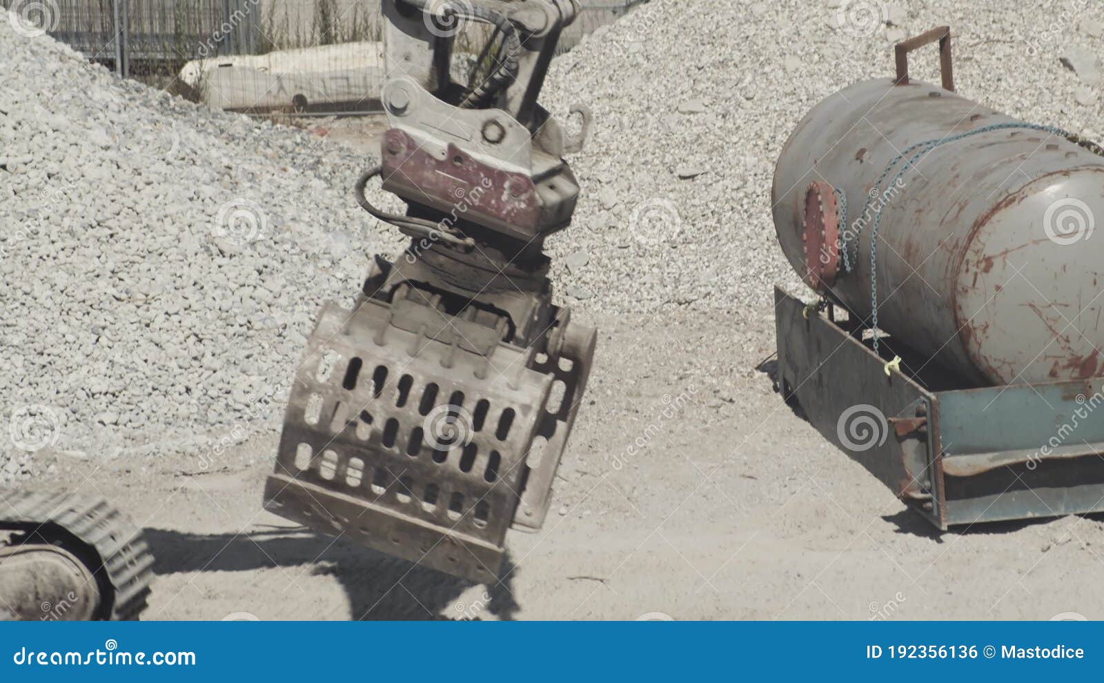Construction Machine with Claw for Demolition or Excavation on a Work ...